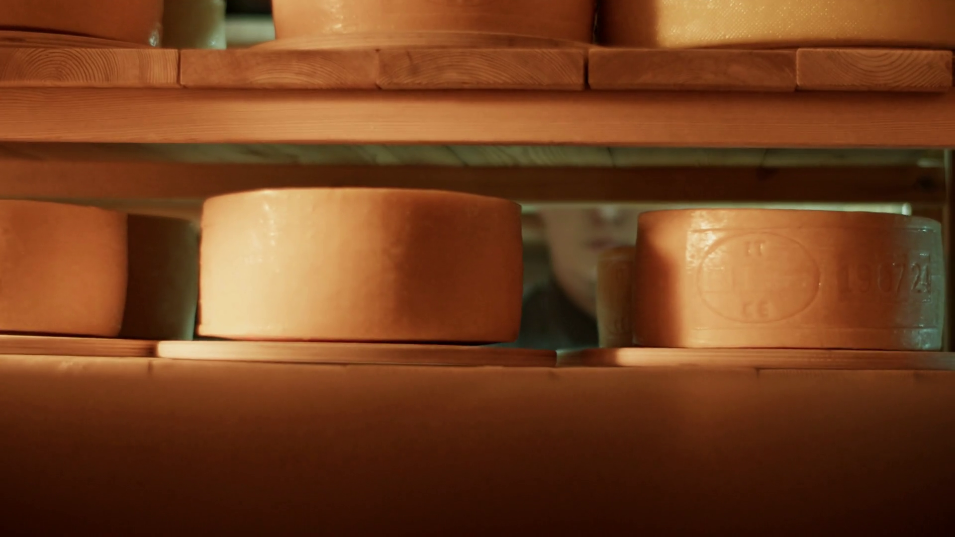 Man Storing Cheese Wheels In Refrigerated Stock Footage SBV-351951711 ...