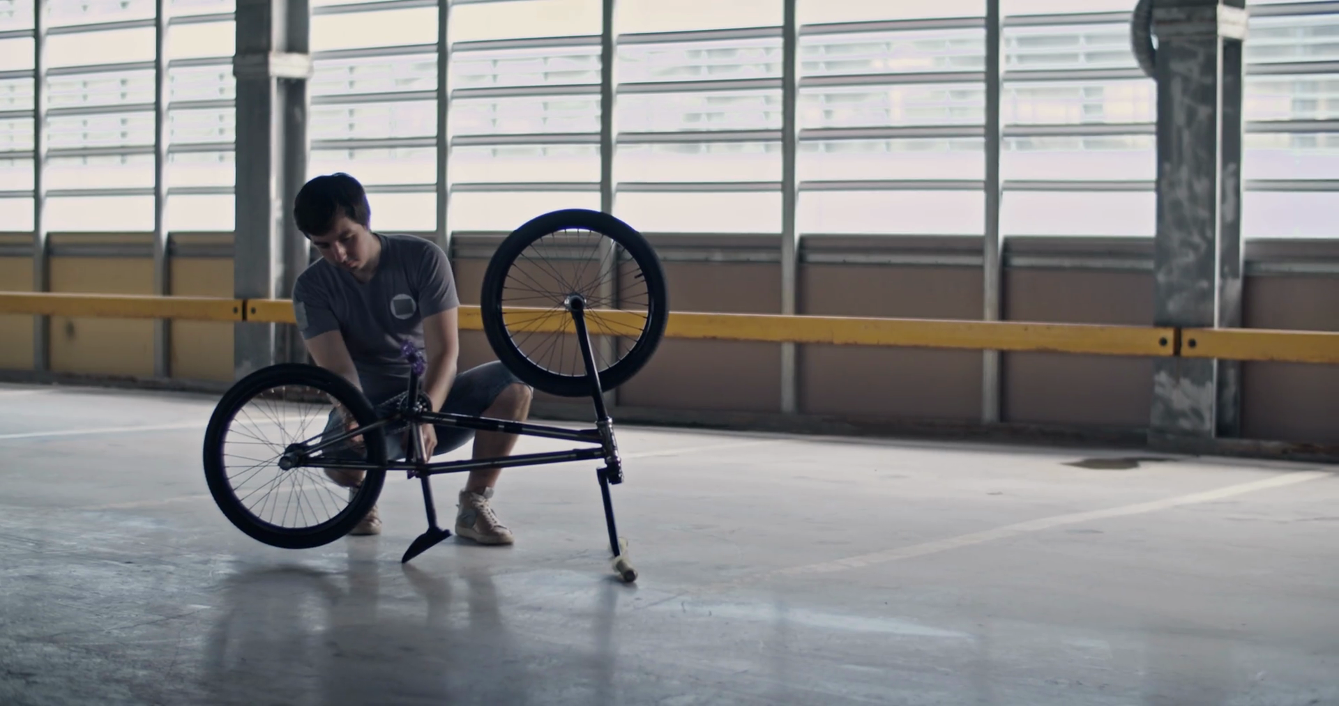Male Bmx Rider Checking Wheel Of Bike In Stock Footage SBV-348473305 ...