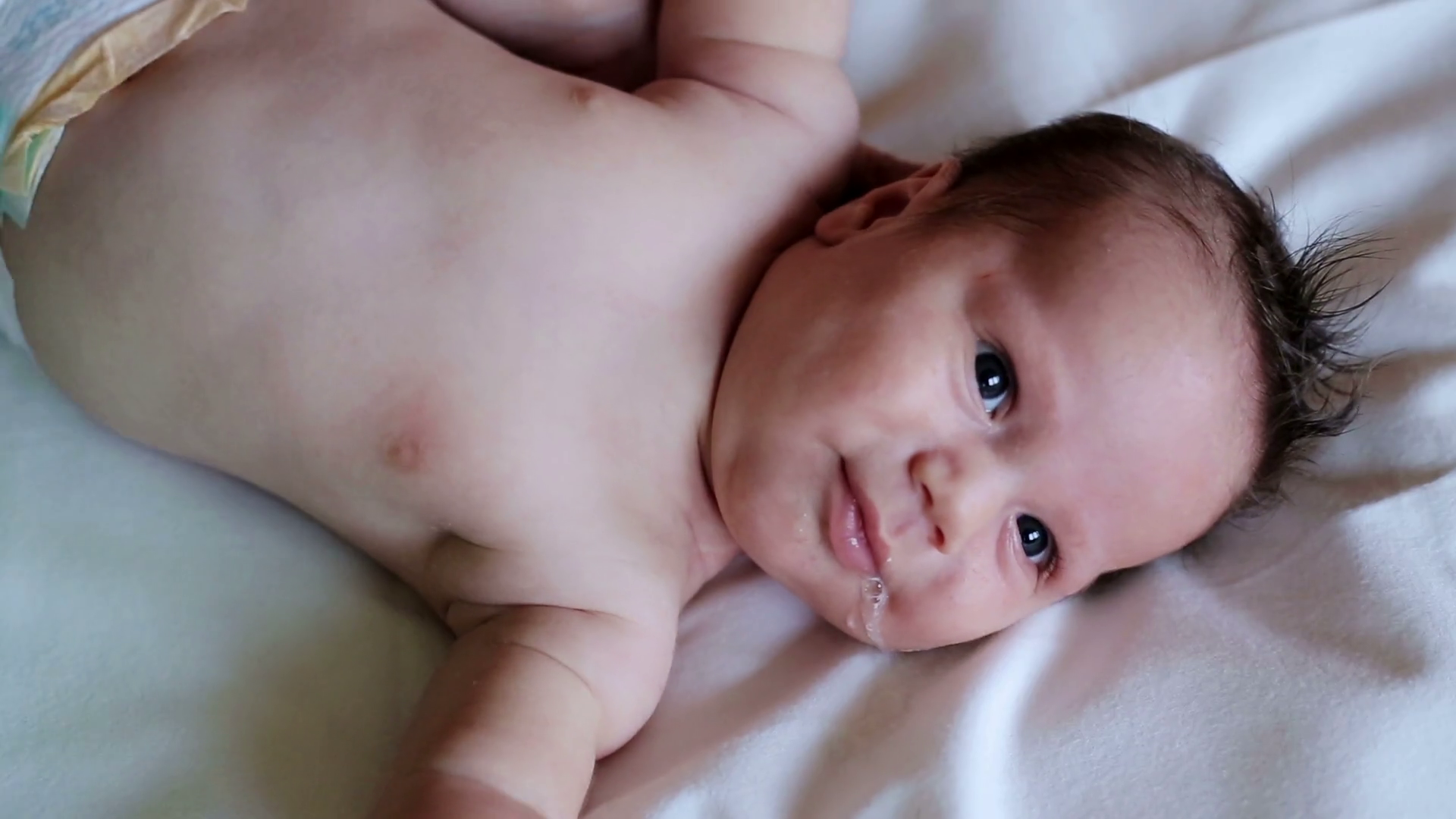 Restless Infant Lying On Back Stock Footage SBV-313649899 - Storyblocks