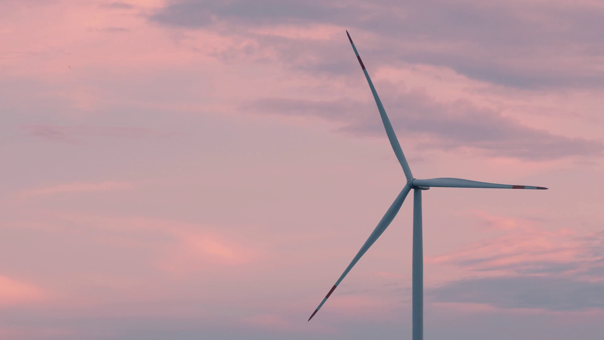Wind Turbine Rotates Slowly In Sunset Sky Stock Footage SBV-347679715 ...