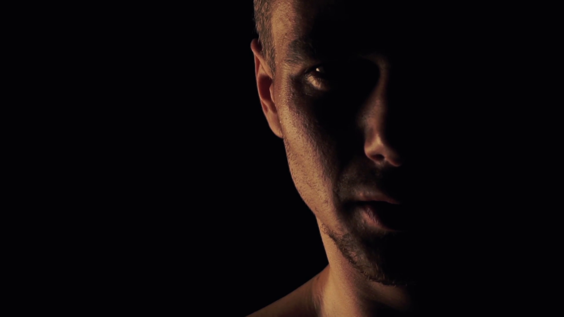 Man Looks On Dark Background Stock Footage SBV-329915932 - Storyblocks