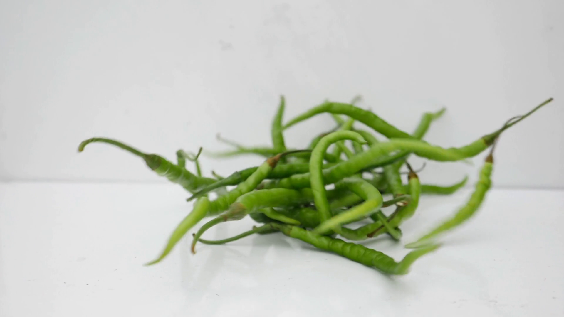 Flying Green Chilli Peppers In Air Stock Footage SBV-338773111 ...