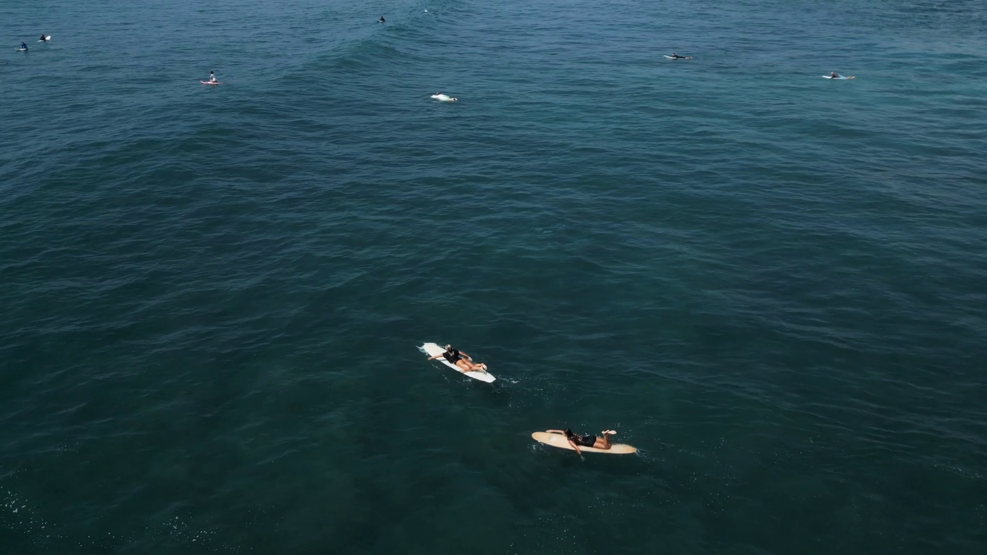 Young Female Surfers Rowing On Surfboard At Stock Footage SBV-347714435 ...