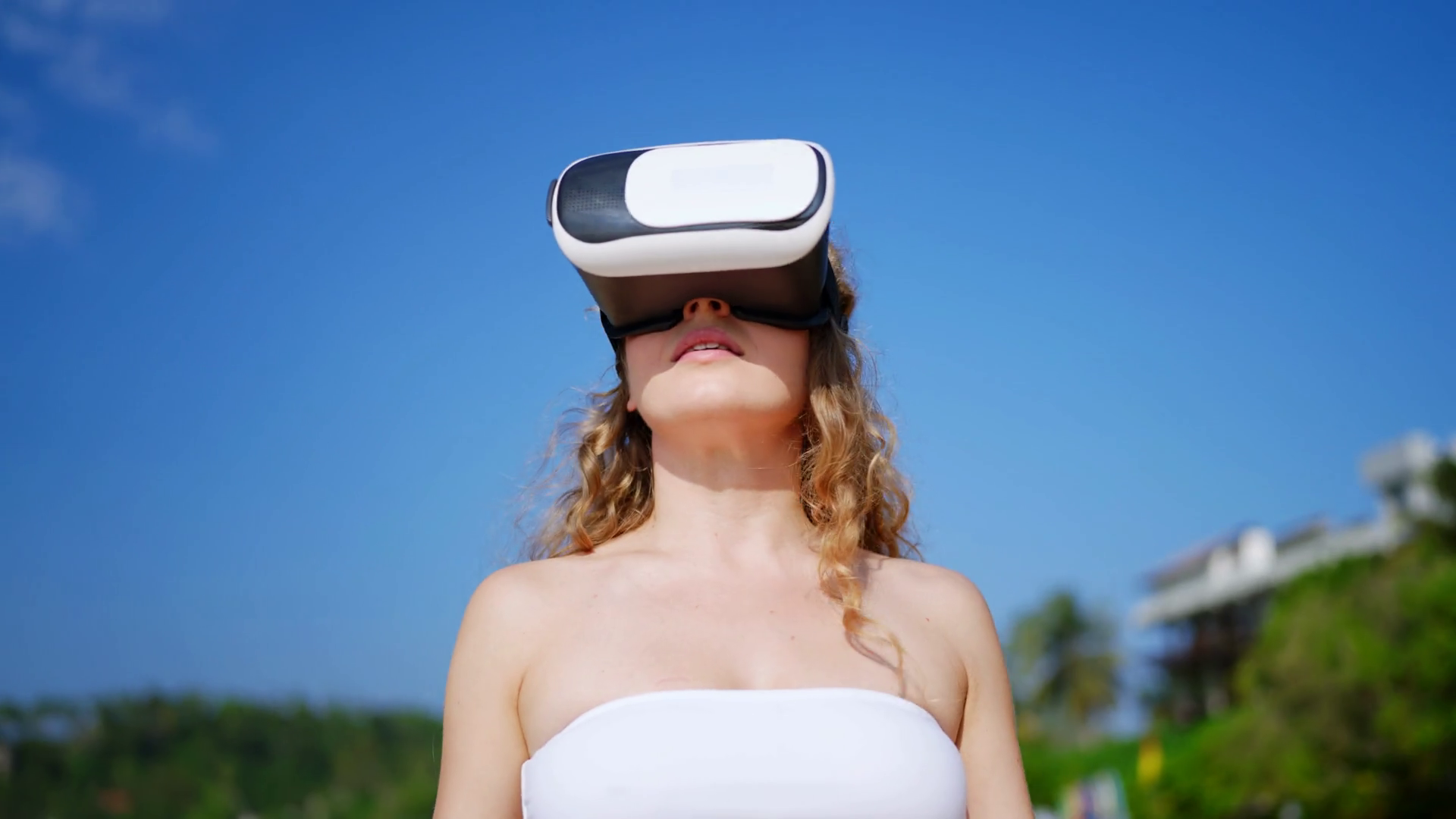 Woman In Vr Headset Explores Virtual Beach Stock Footage SBV-348805534 ...