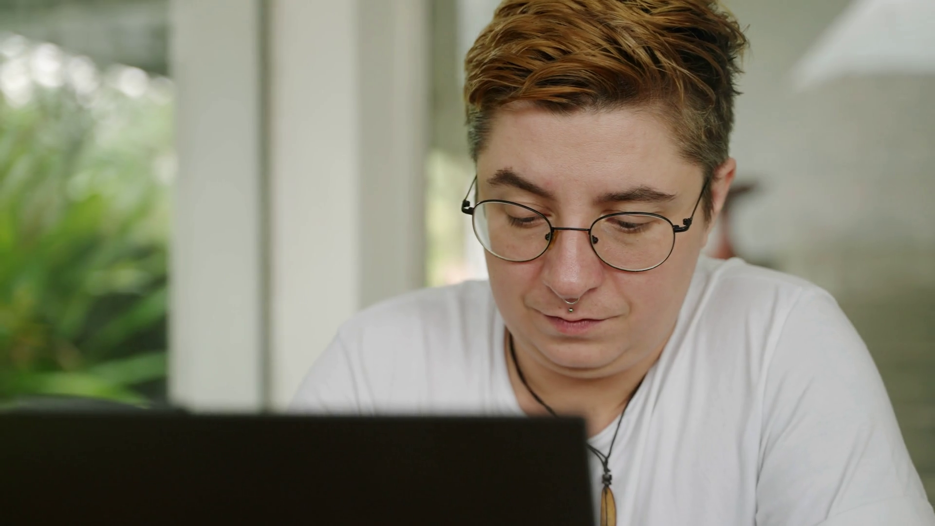 Transgender Individual Works On Laptop At Stock Footage SBV-348820305 ...