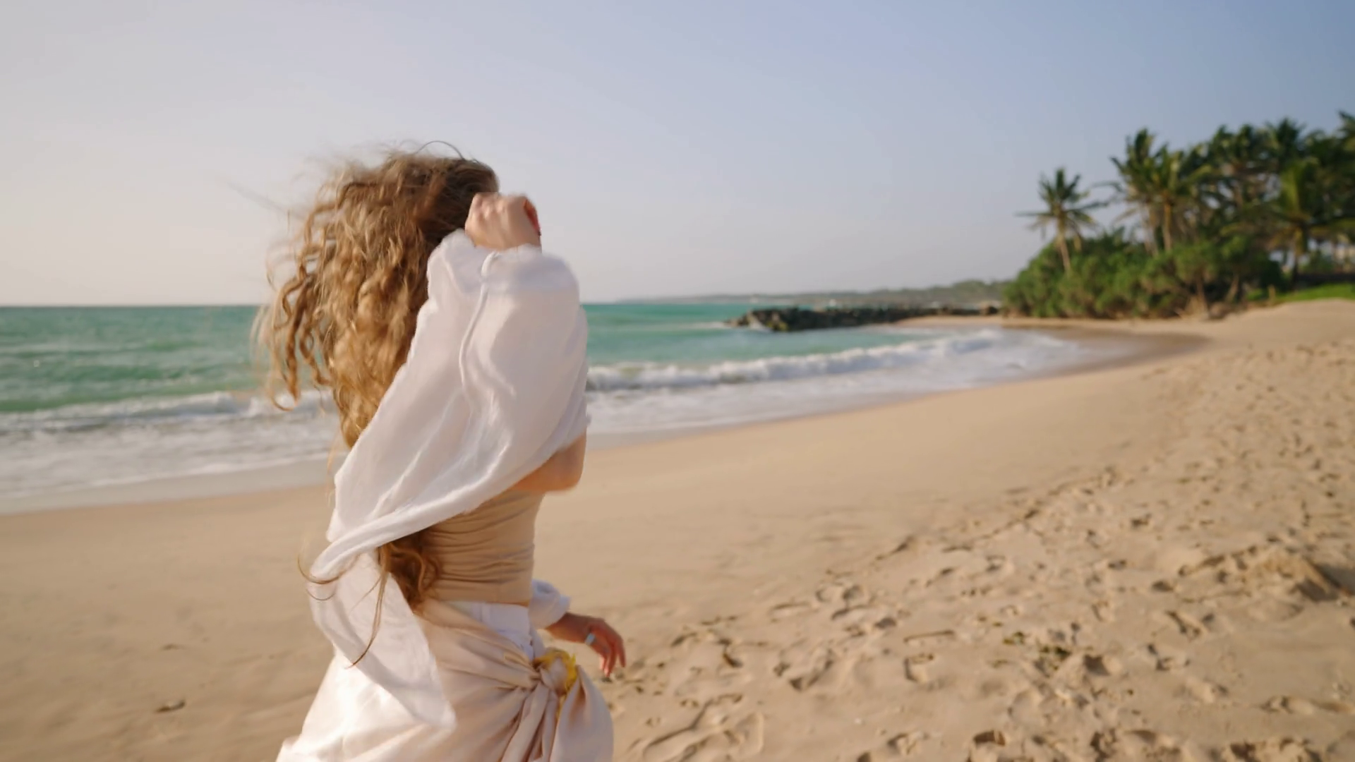 Young Woman Running Turning Back At Sandy Stock Footage SBV-348820572 ...