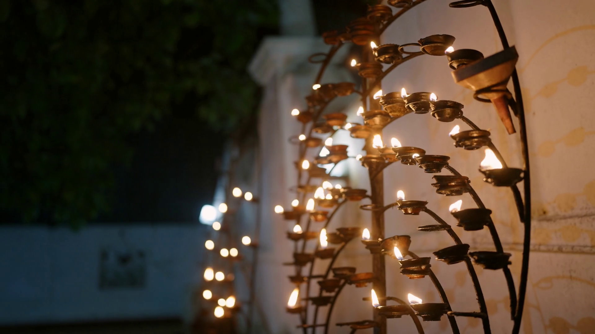 Rows Of Oil Lamps Illuminate Buddhist Temple Stock Footage SBV ...