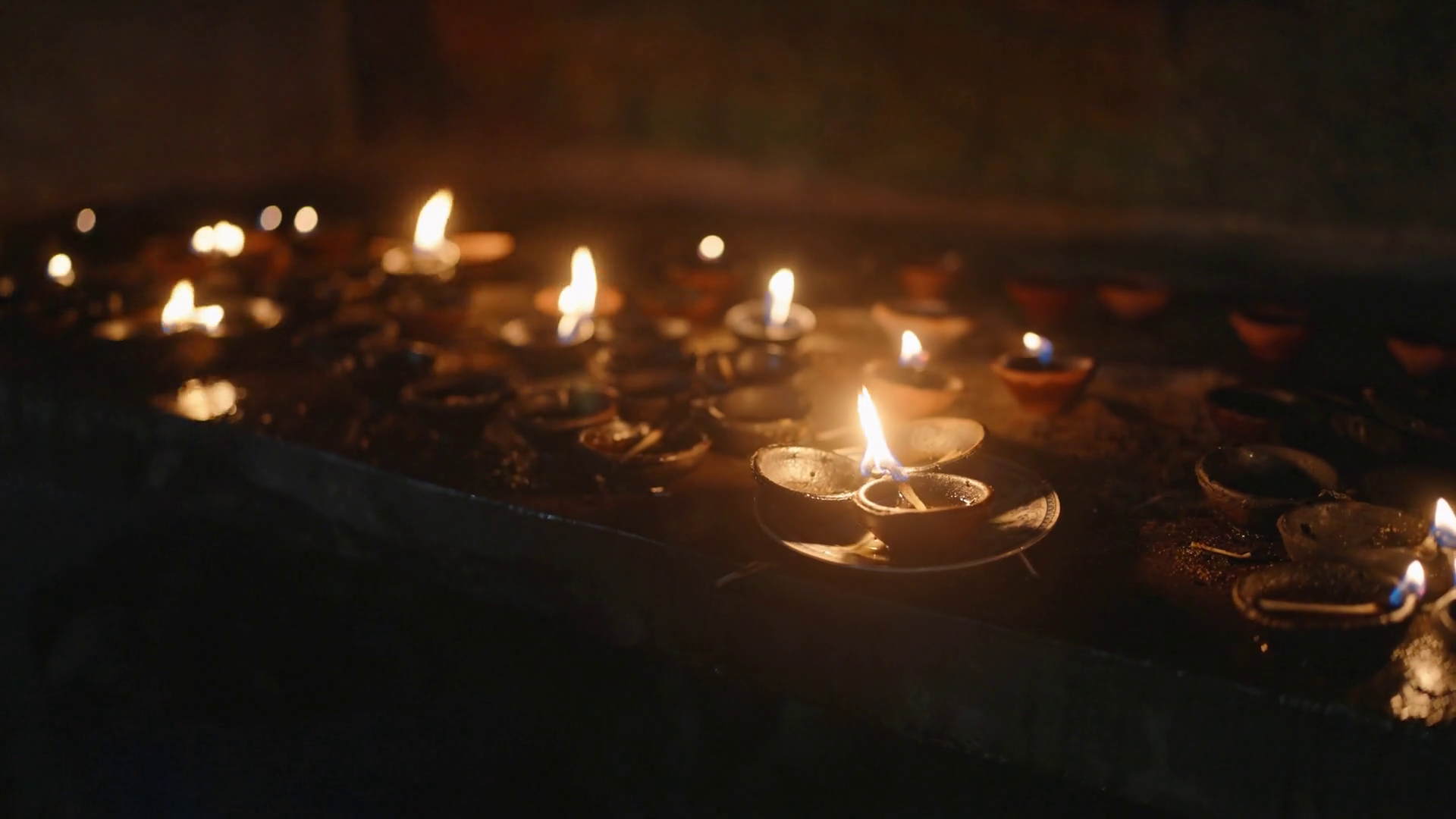 Oil Lamps Flicker In Dim Light At Buddhist Stock Footage SBV-348839650 ...