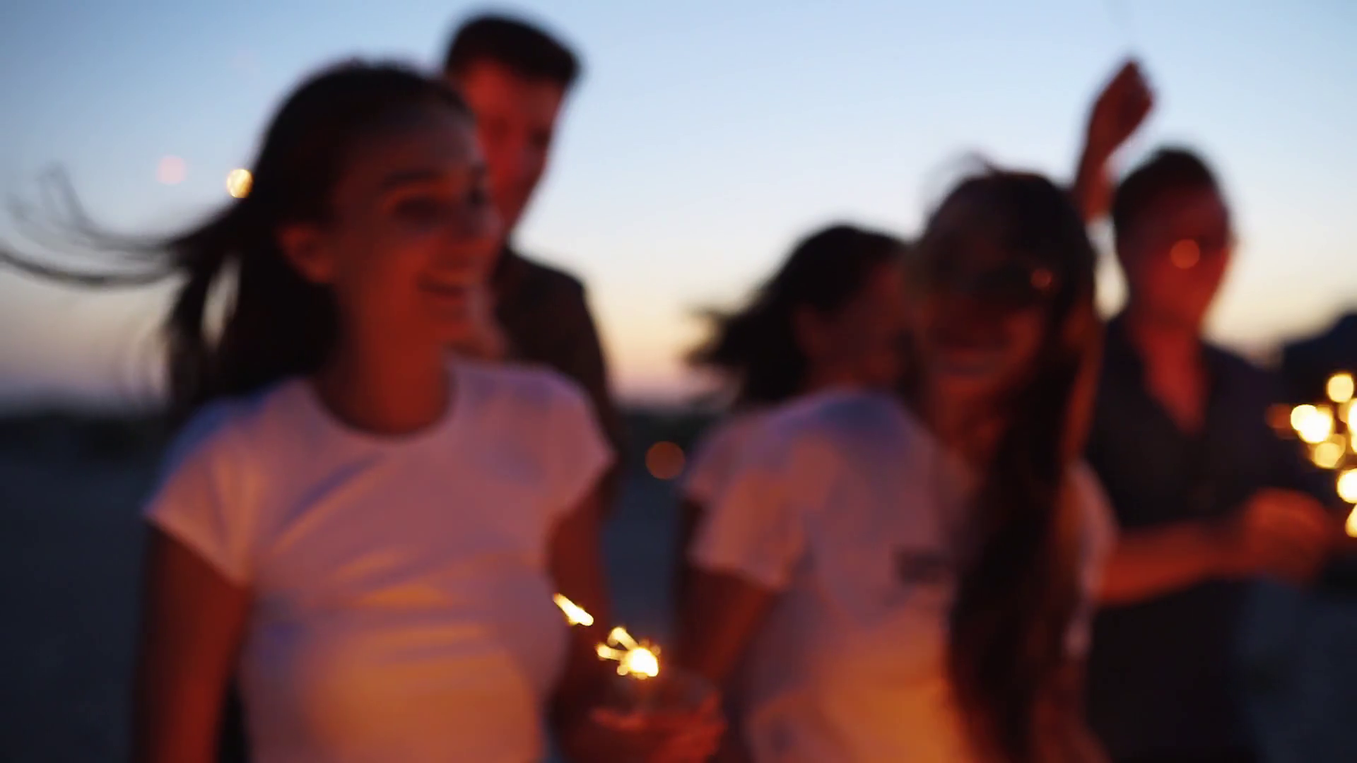 Friends Enjoying Lively Beach Party With Stock Footage SBV-338558730 ...