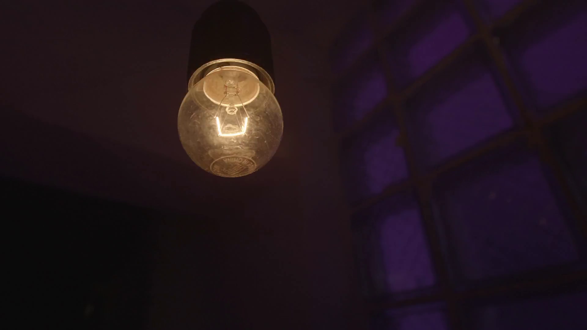 Light Bulb Without Lamp Shade Hanging From Stock Footage SBV-348449496 ...