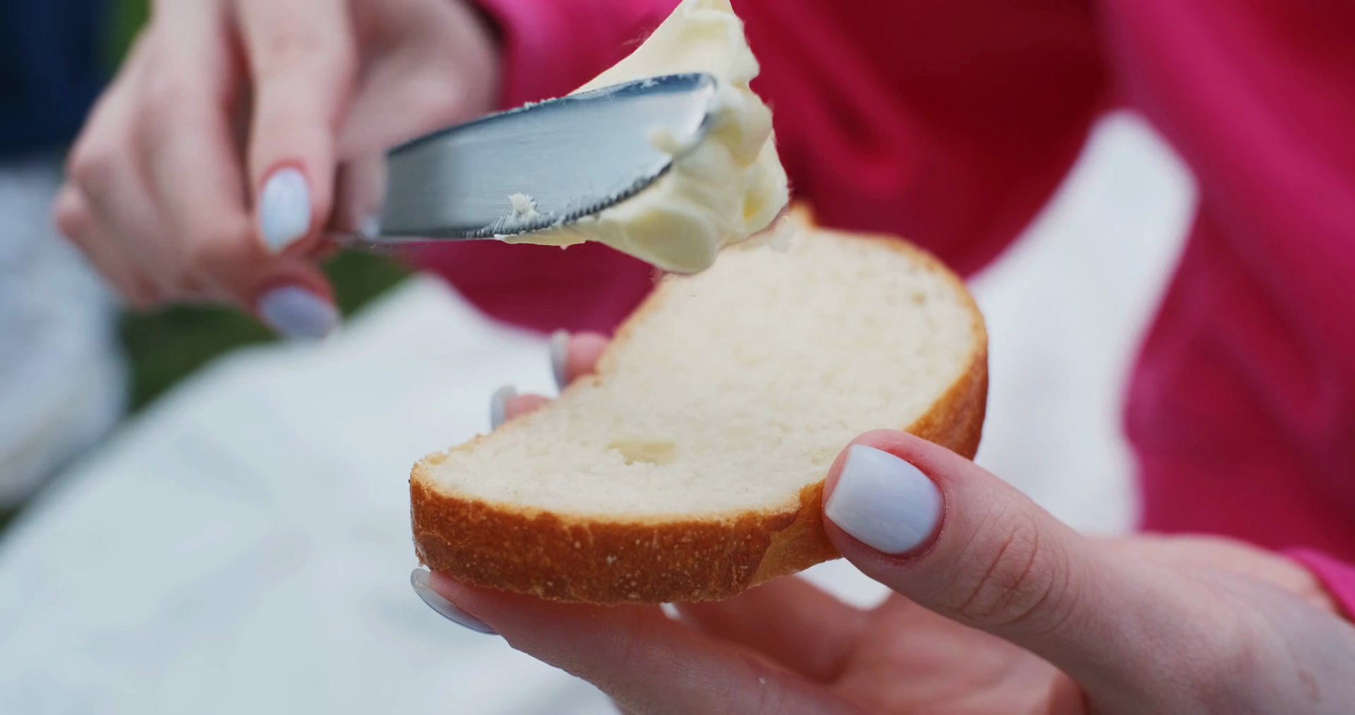 Close-up Of Woman Spreading Butter On Bread Stock Footage SBV-348504382 ...