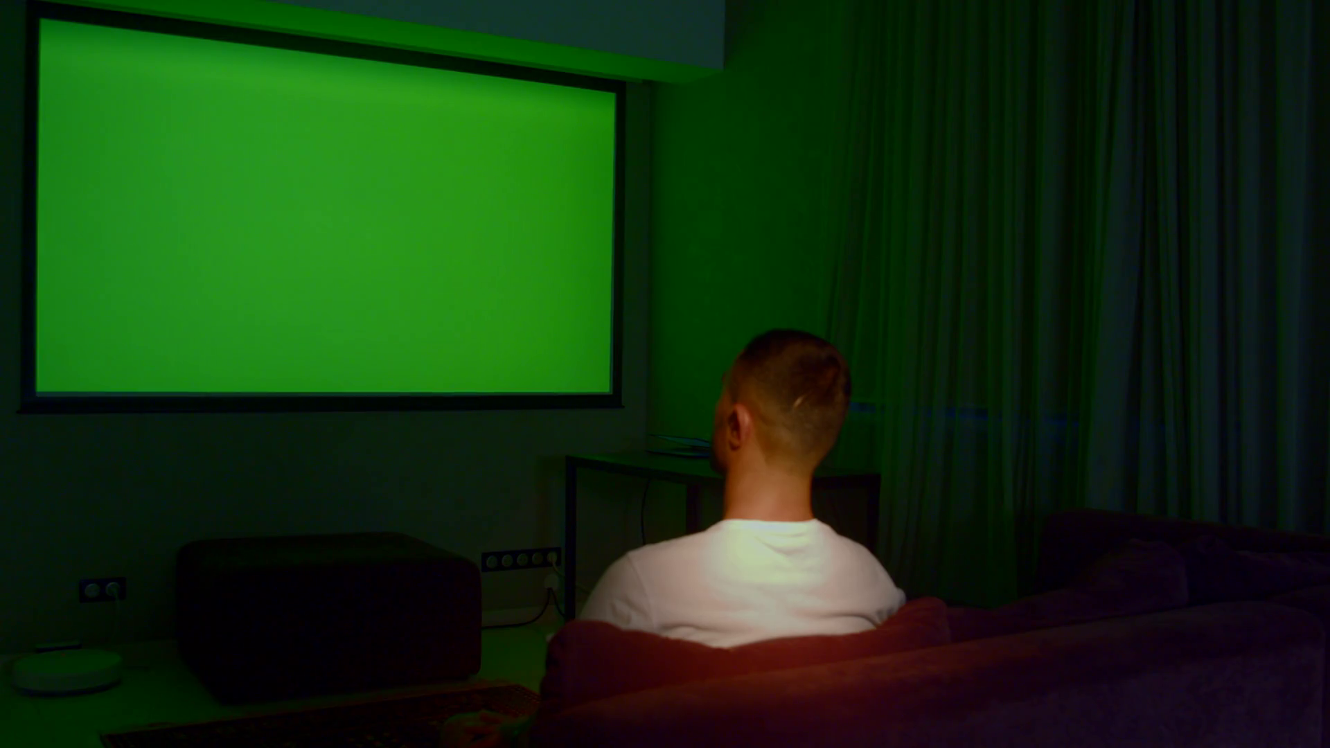 Man Watching Tv With Green Screen In Living Stock Footage SBV-348510025 ...