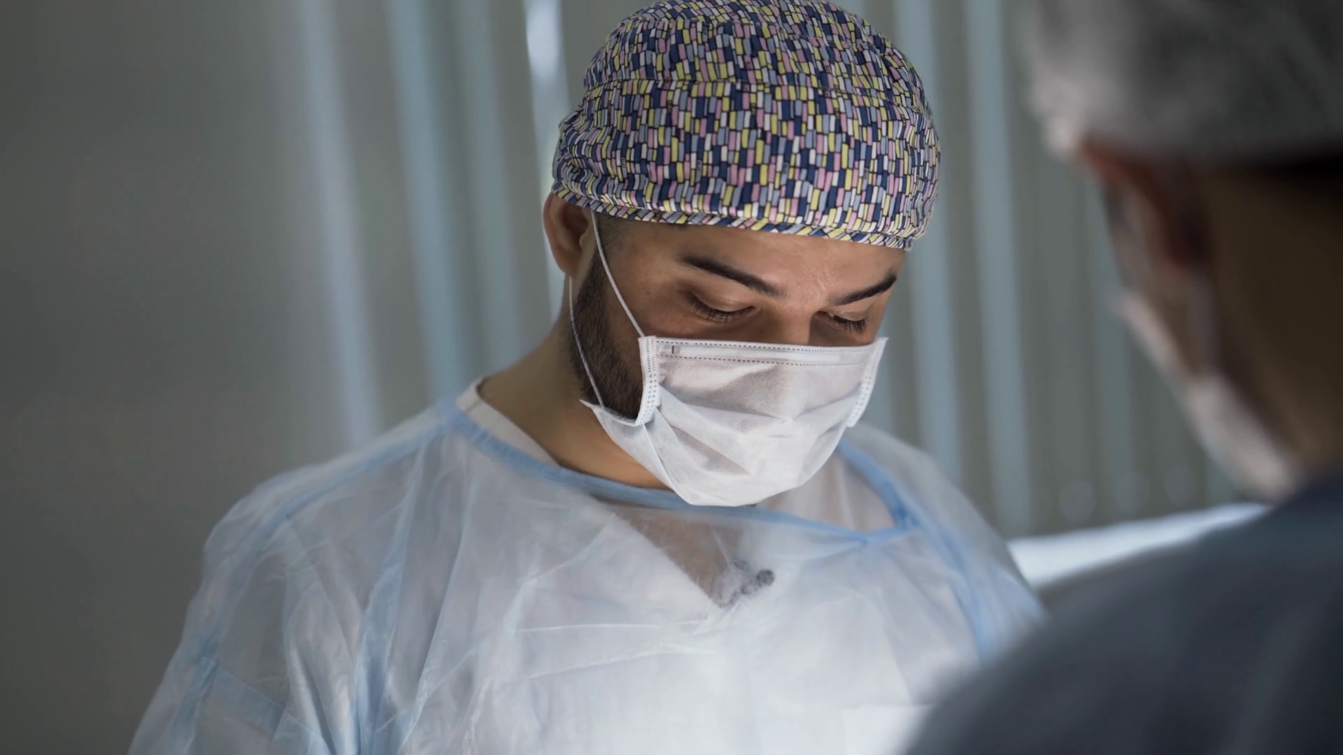 Close Up Of Two Male Surgeons Looking Down Stock Footage SBV-348515995 ...