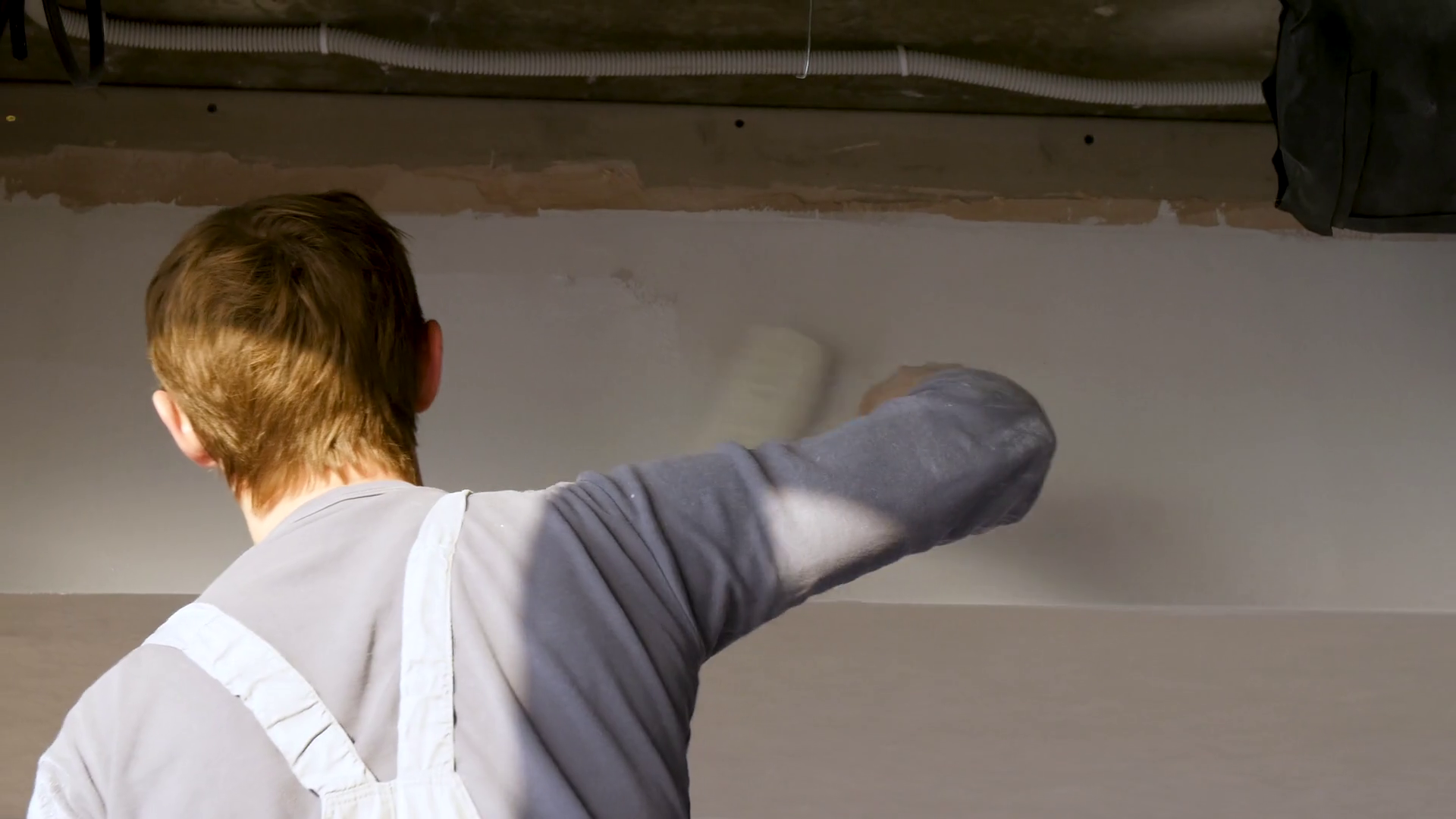 Back View Of Painter Painting Wall With Stock Footage SBV-348514717 ...