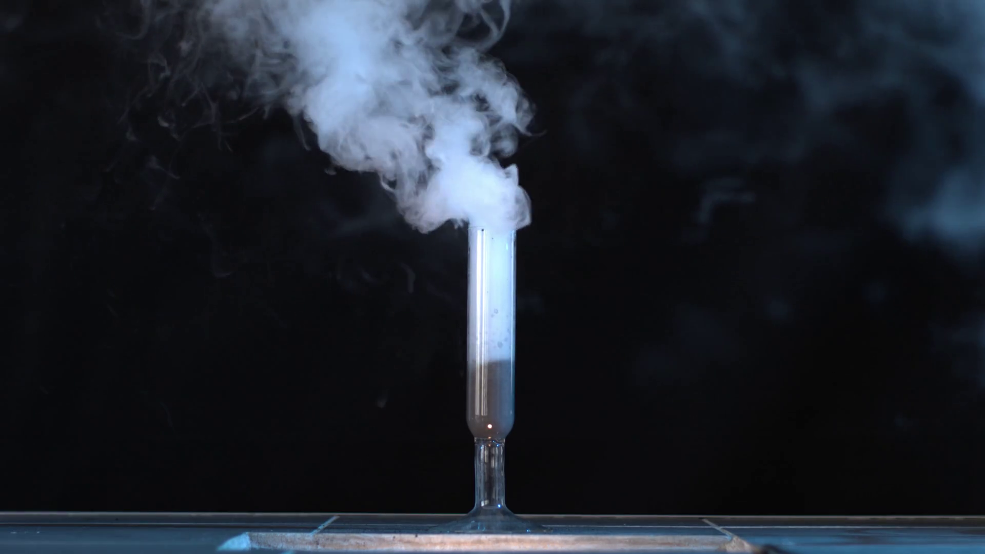 Measuring Glass With Smoke On Table Of Stock Footage SBV-348518895 ...