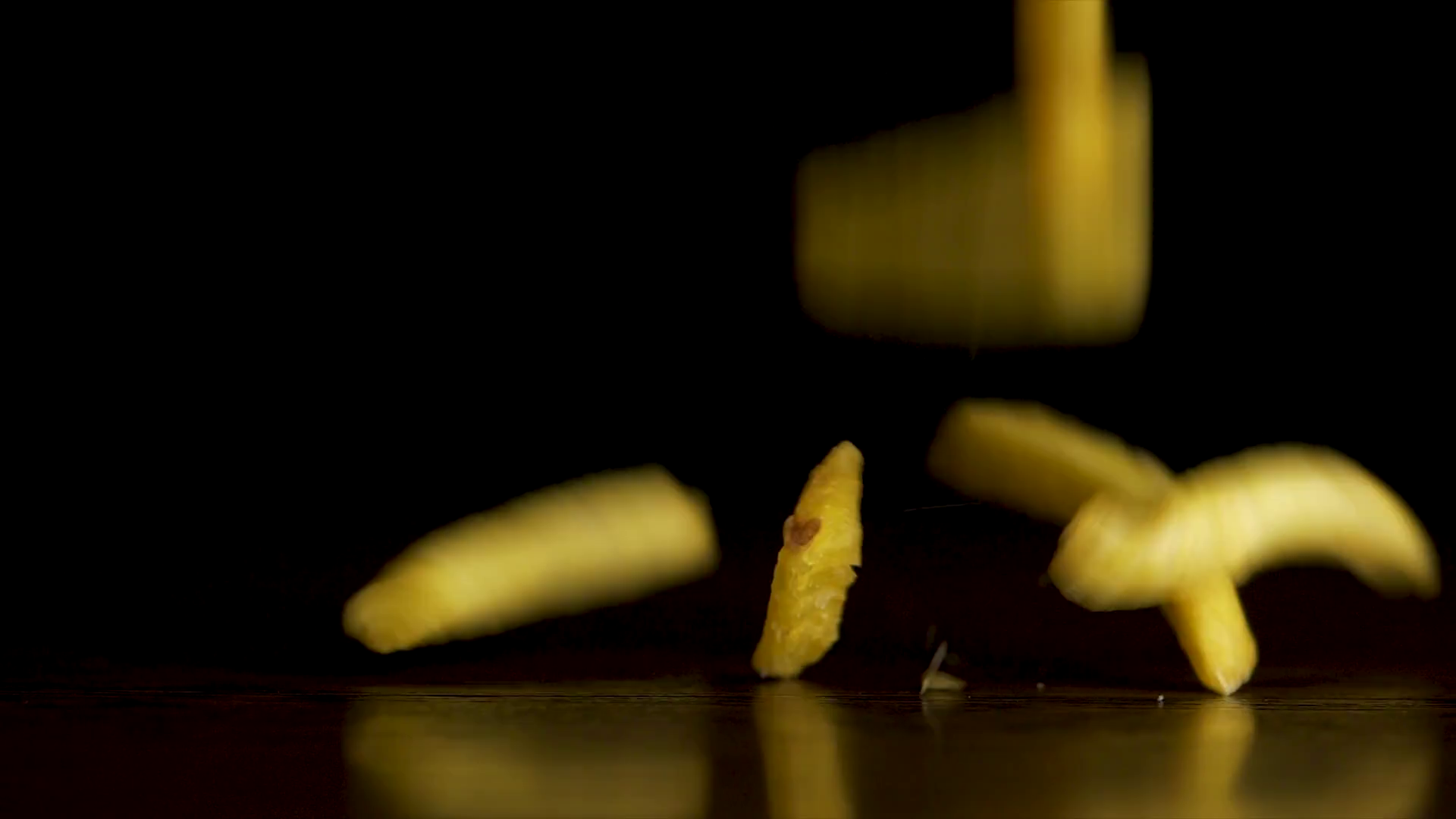 French Fries Fall On Table Isolated On Black Stock Footage SBV ...