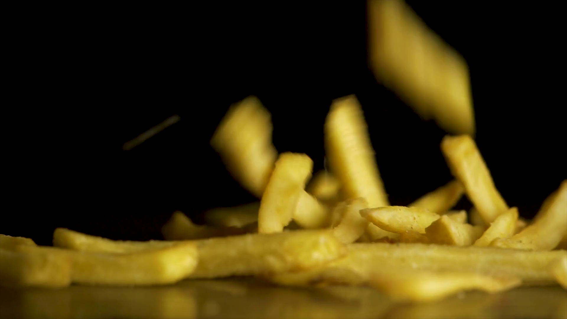 French Fries Fall On Table Isolated On Black Stock Footage SBV ...