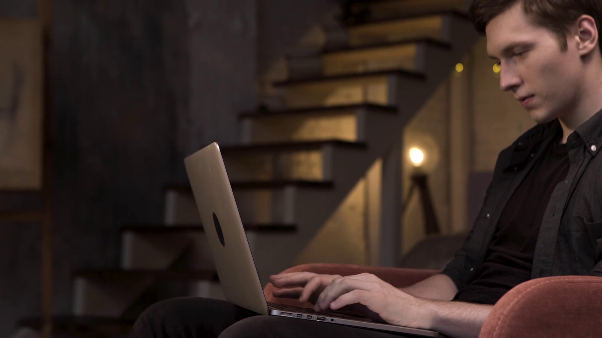 Side View Of Young Man Using Laptop Sitting Stock Footage SBV-348536073 ...