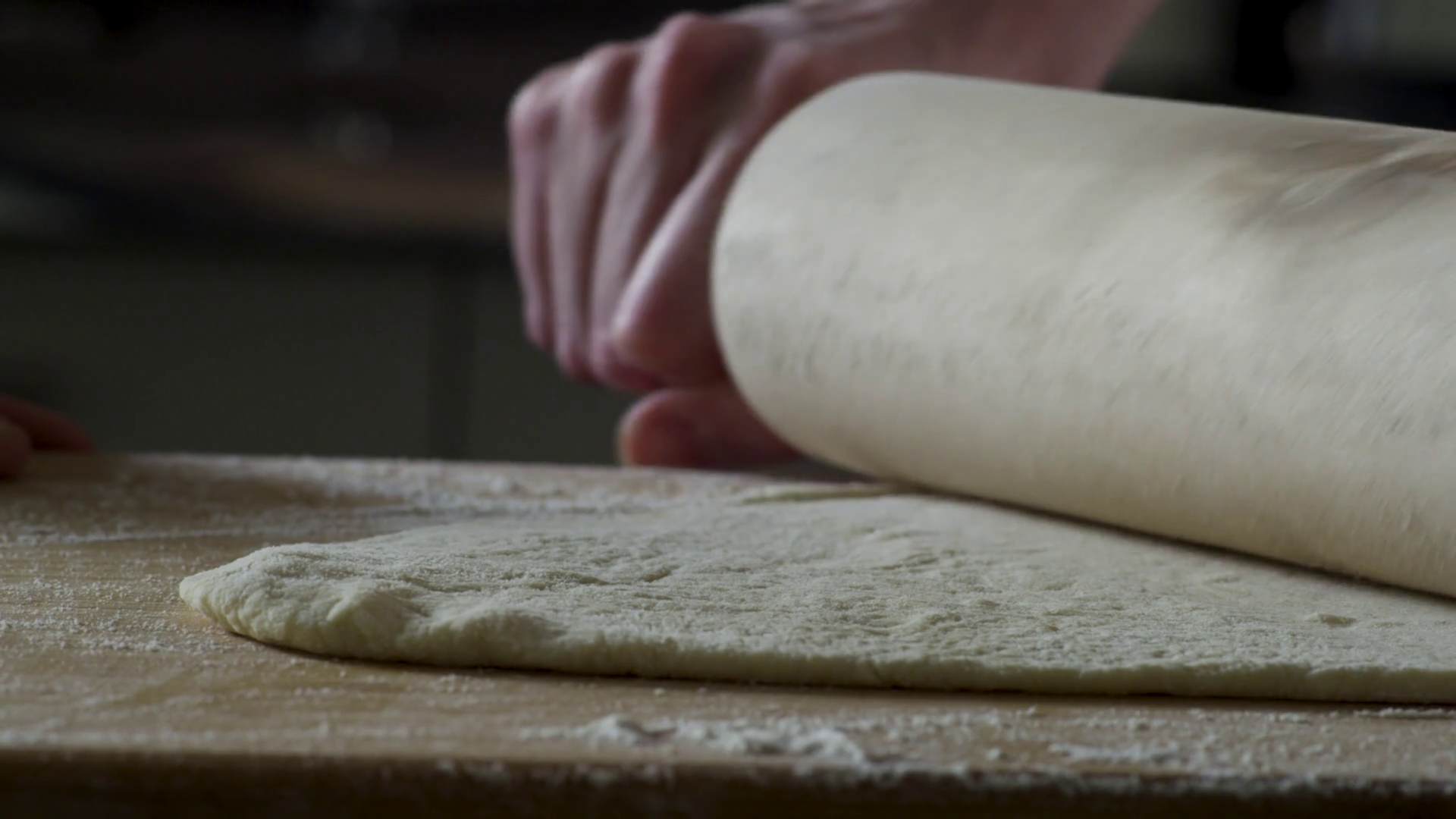 Man Rolling Out Dough On Kitchen Table Close Stock Footage SBV ...