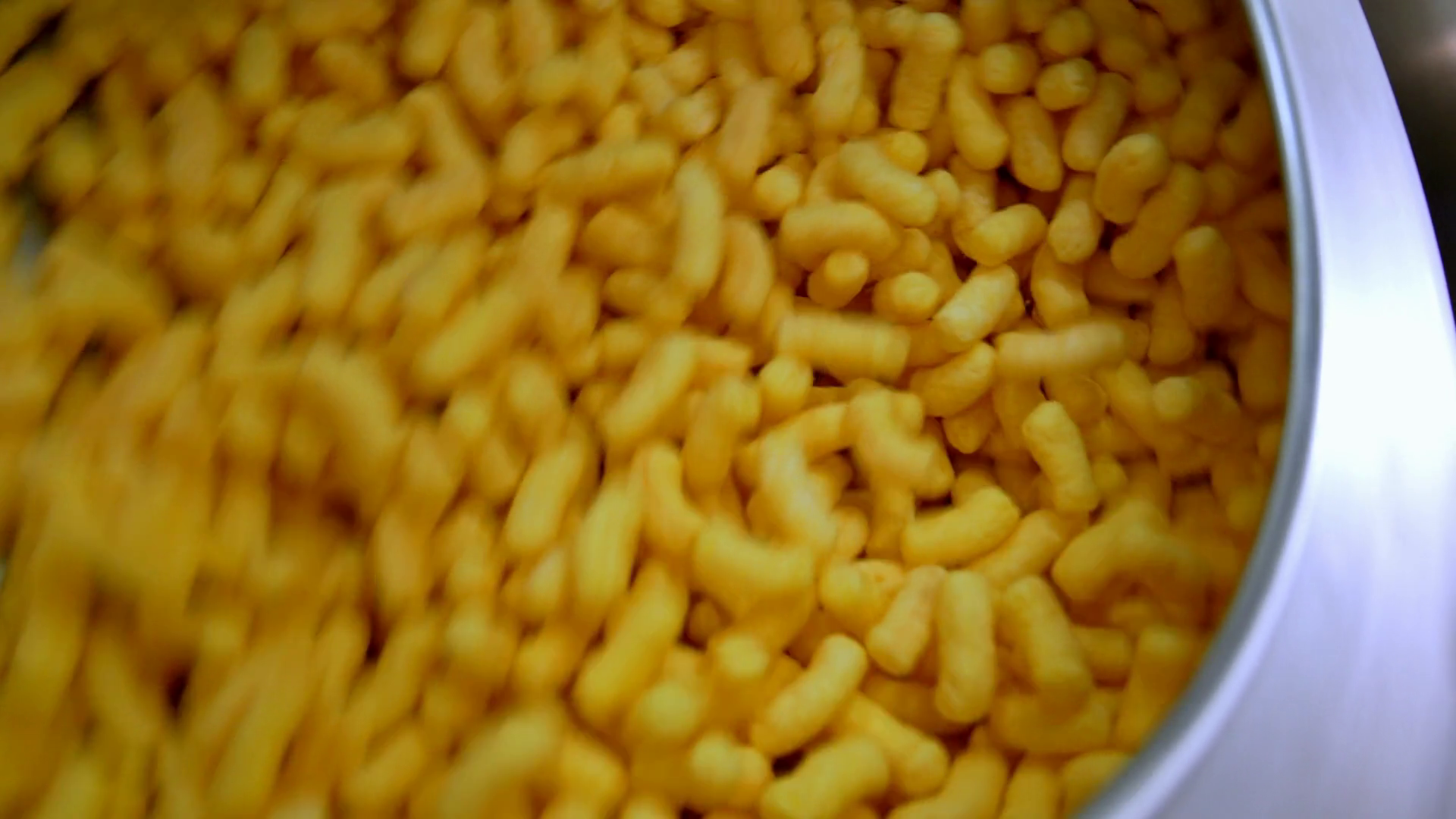 Plenty Of Sweet Corn Snacks Being Mixed In Stock Footage SBV-352925902 ...