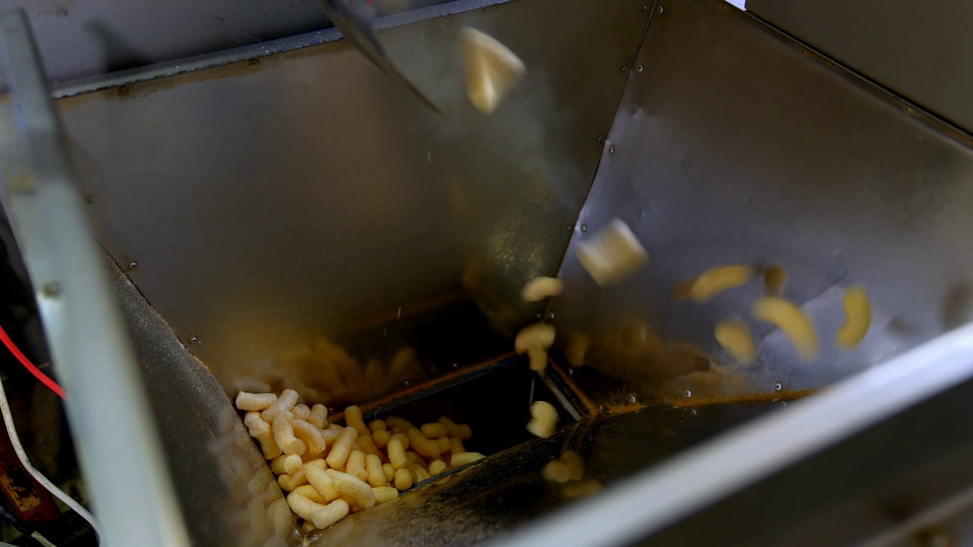 Sweet Snacks Made Of Maize Are Dropped Into Stock Footage SBV-352978282 ...