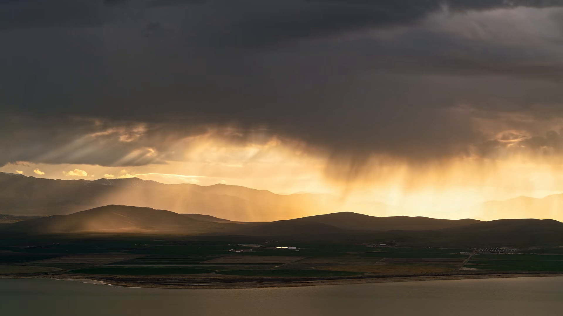 Sun Rays Beaming Light Through Rainstorm Stock Footage SBV-353518330 ...