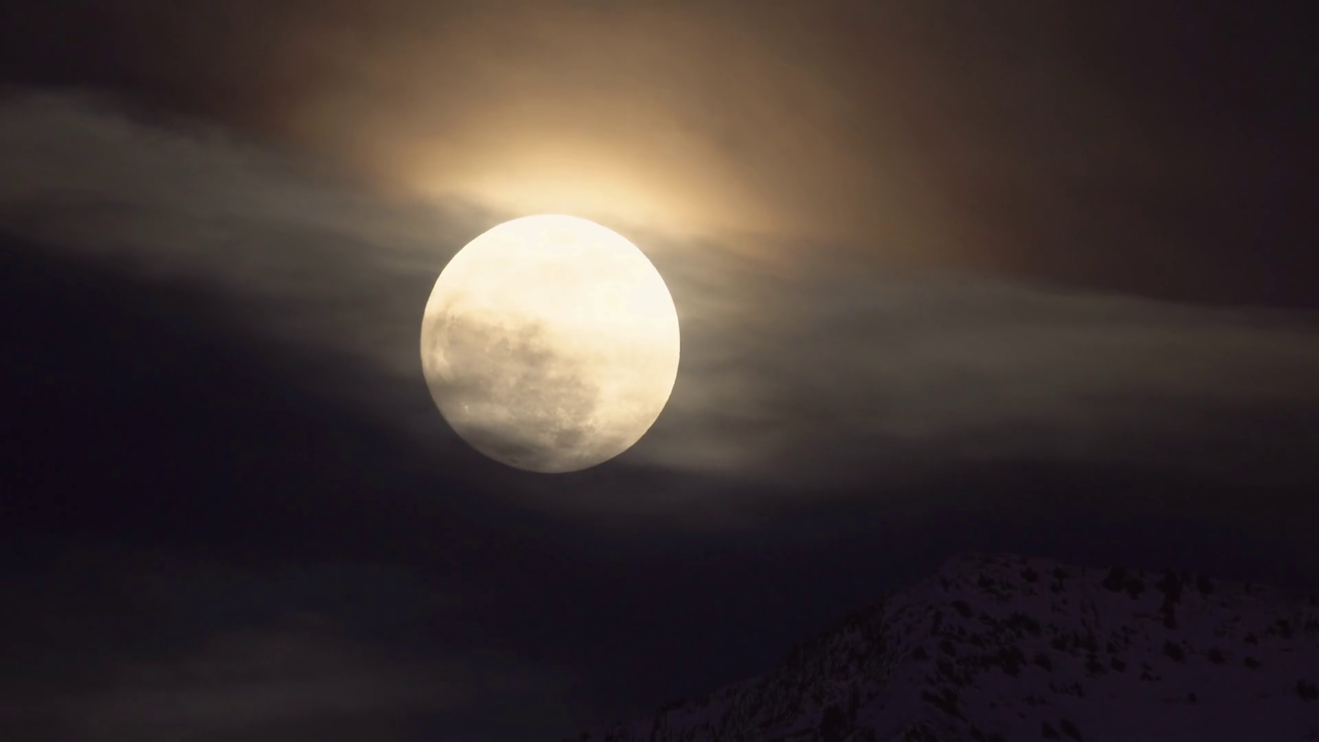 Full Moon Reflecting On Passing Clouds Above Stock Footage SBV ...