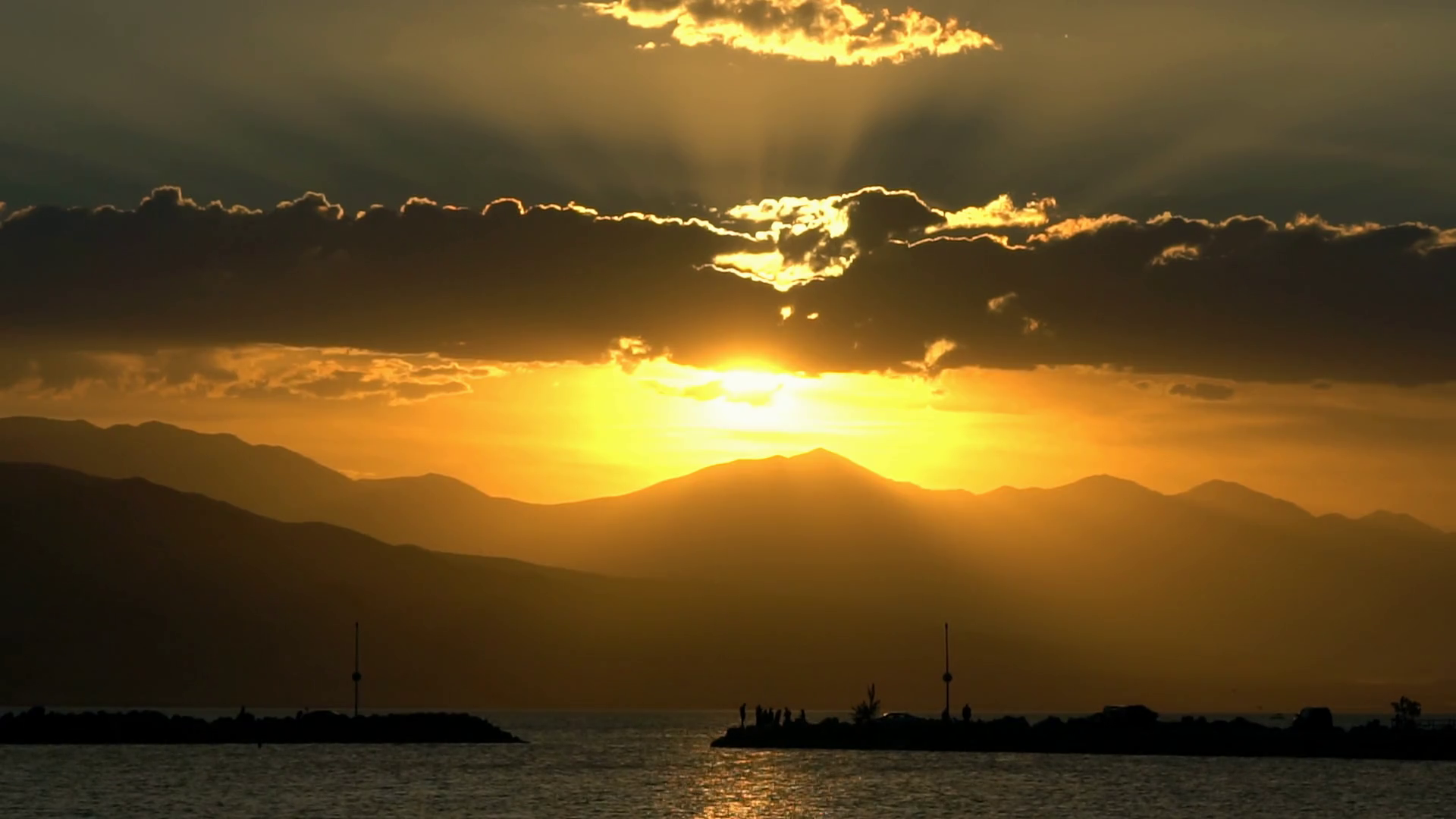 Sun Flares Bursting Through Clouds At Sunset Stock Footage SBV ...