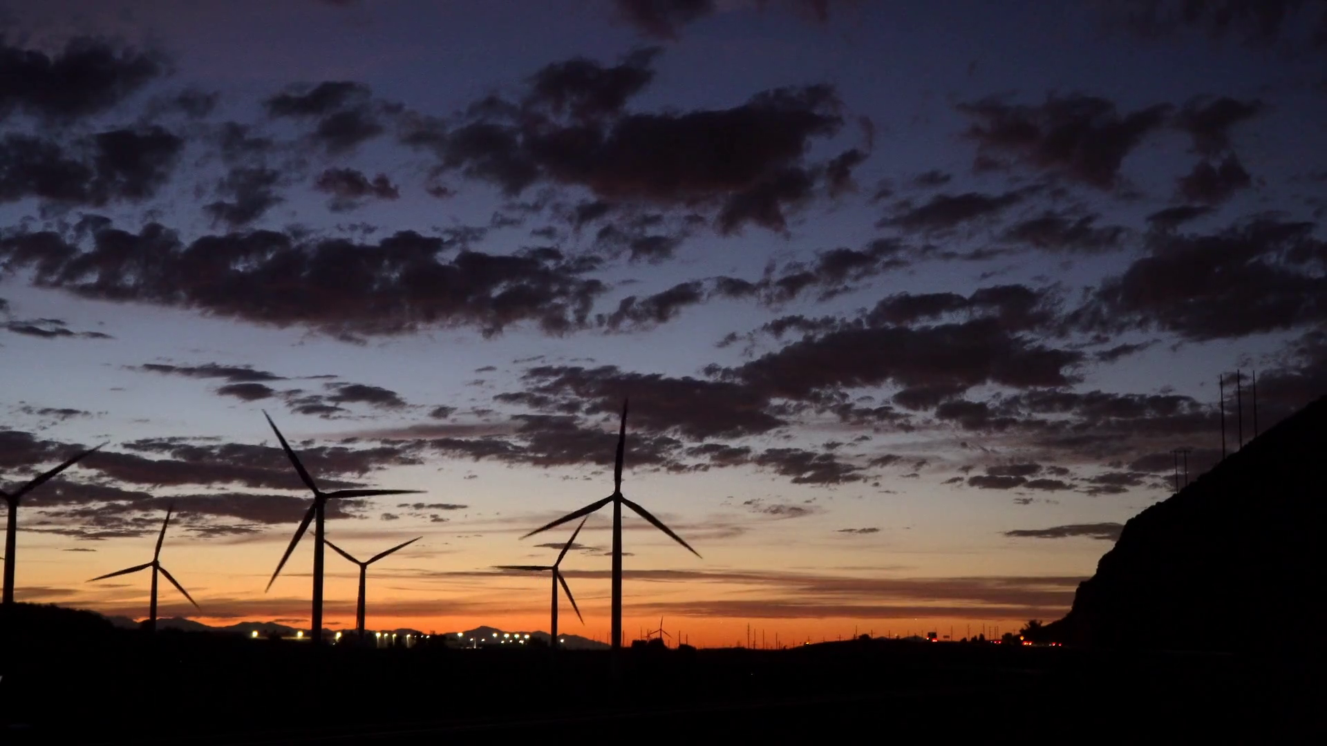 Windmills Spinning Against Colorful Sky At Stock Footage SBV-348634417 ...