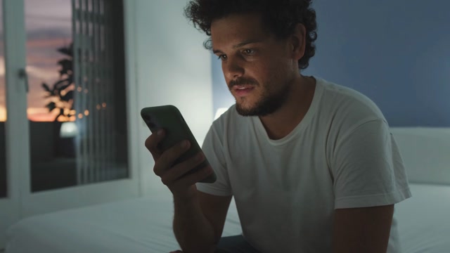 Man Wathcing Video Stock Footage: Royalty-Free Video Clips - Storyblocks