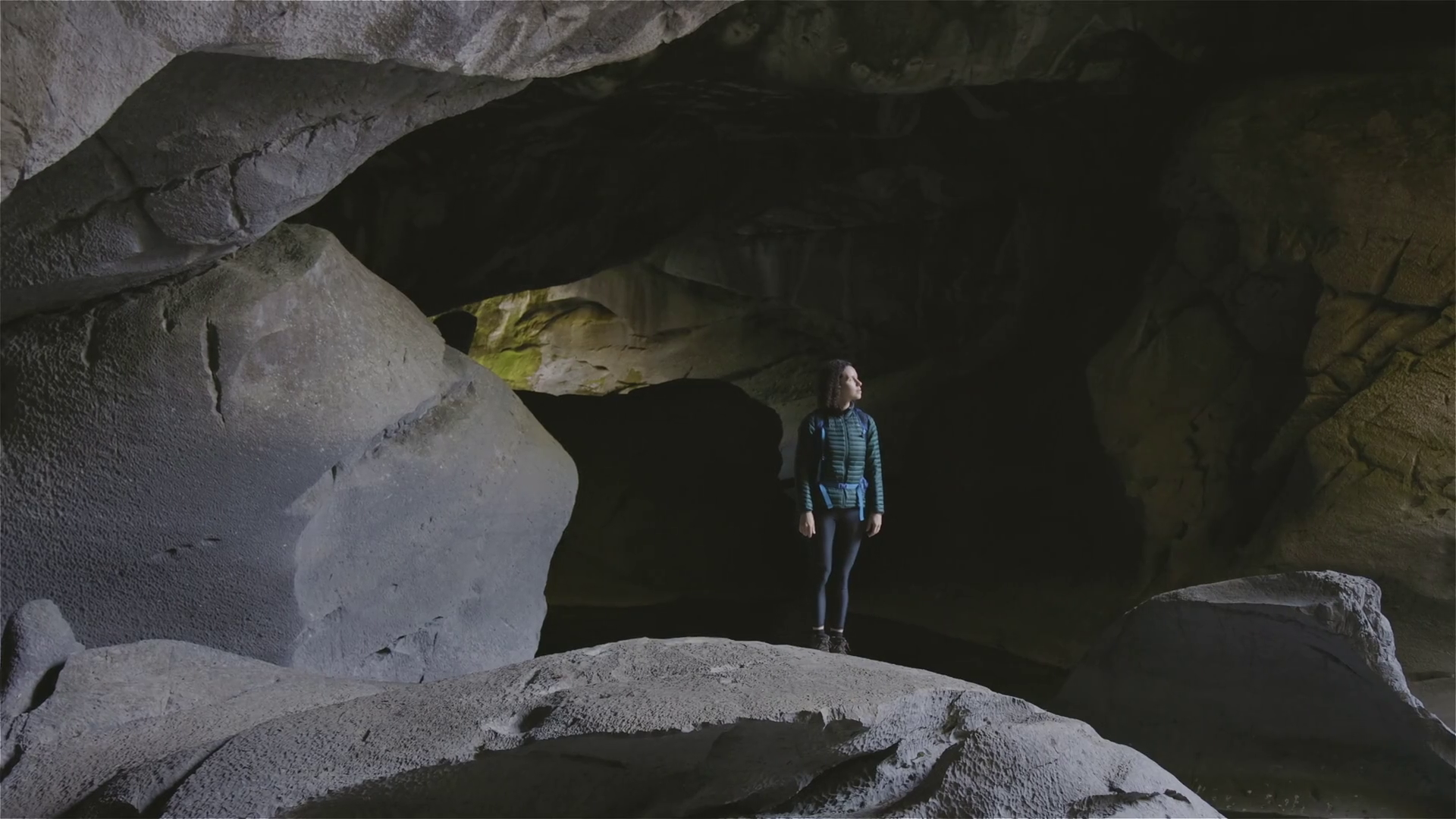 Adventurous Woman Standing Inside Cave Stock Footage SBV-347794280 ...