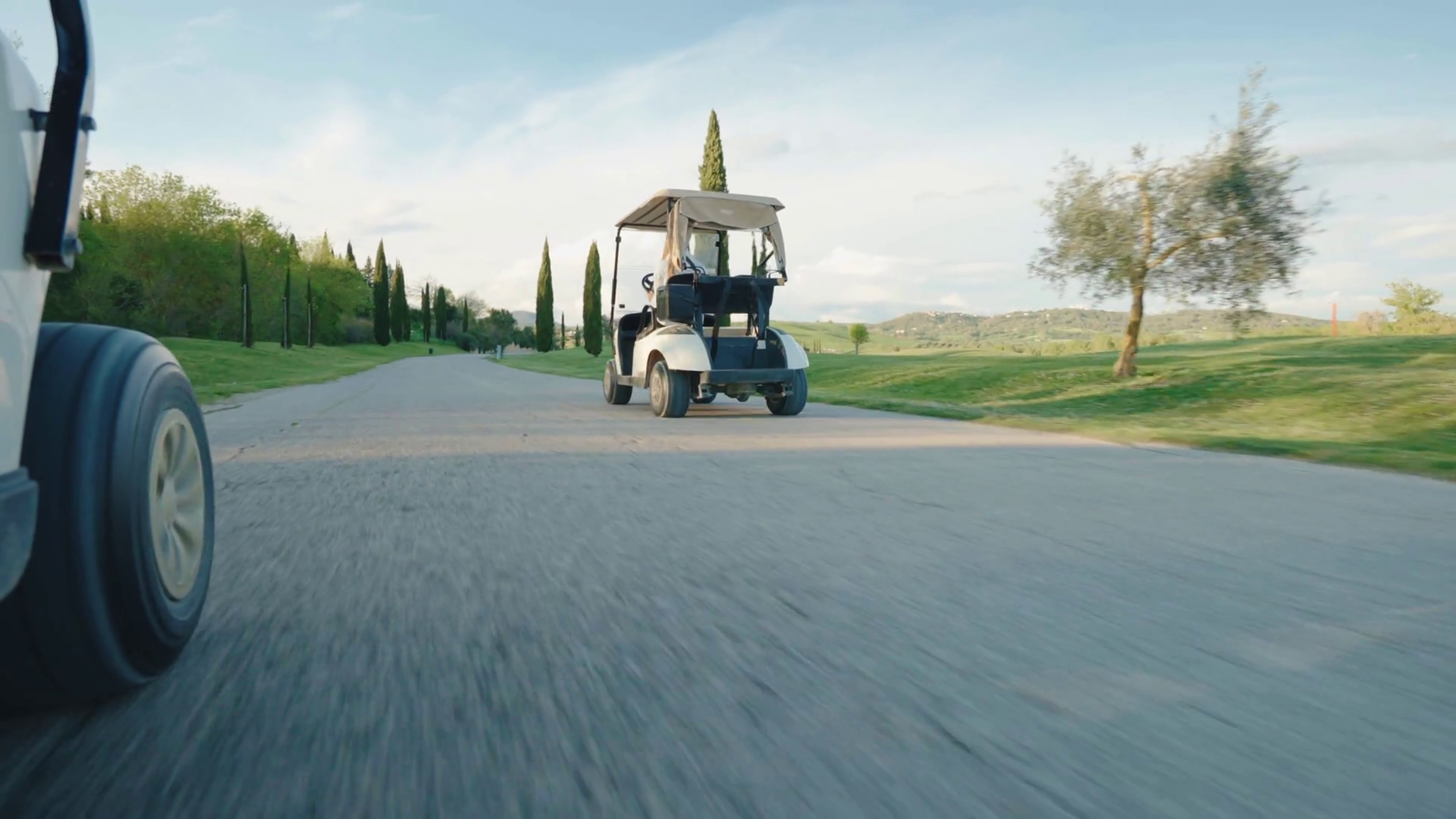Bottom View Shot Of Driving Golf Carts Along Stock Footage SBV ...