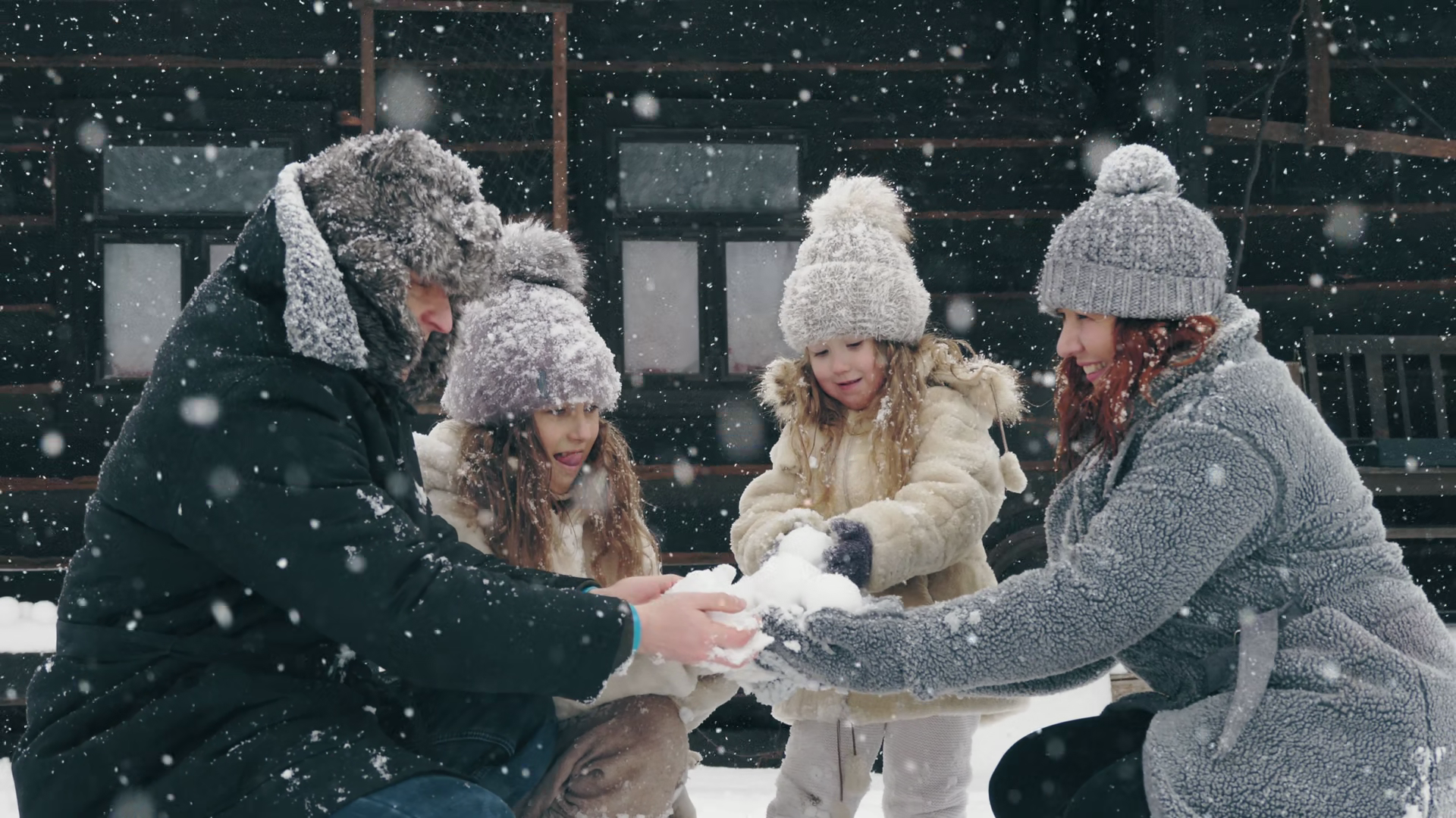 Happy Family Of Four Making Snowballs In Stock Footage SBV-353683387 ...