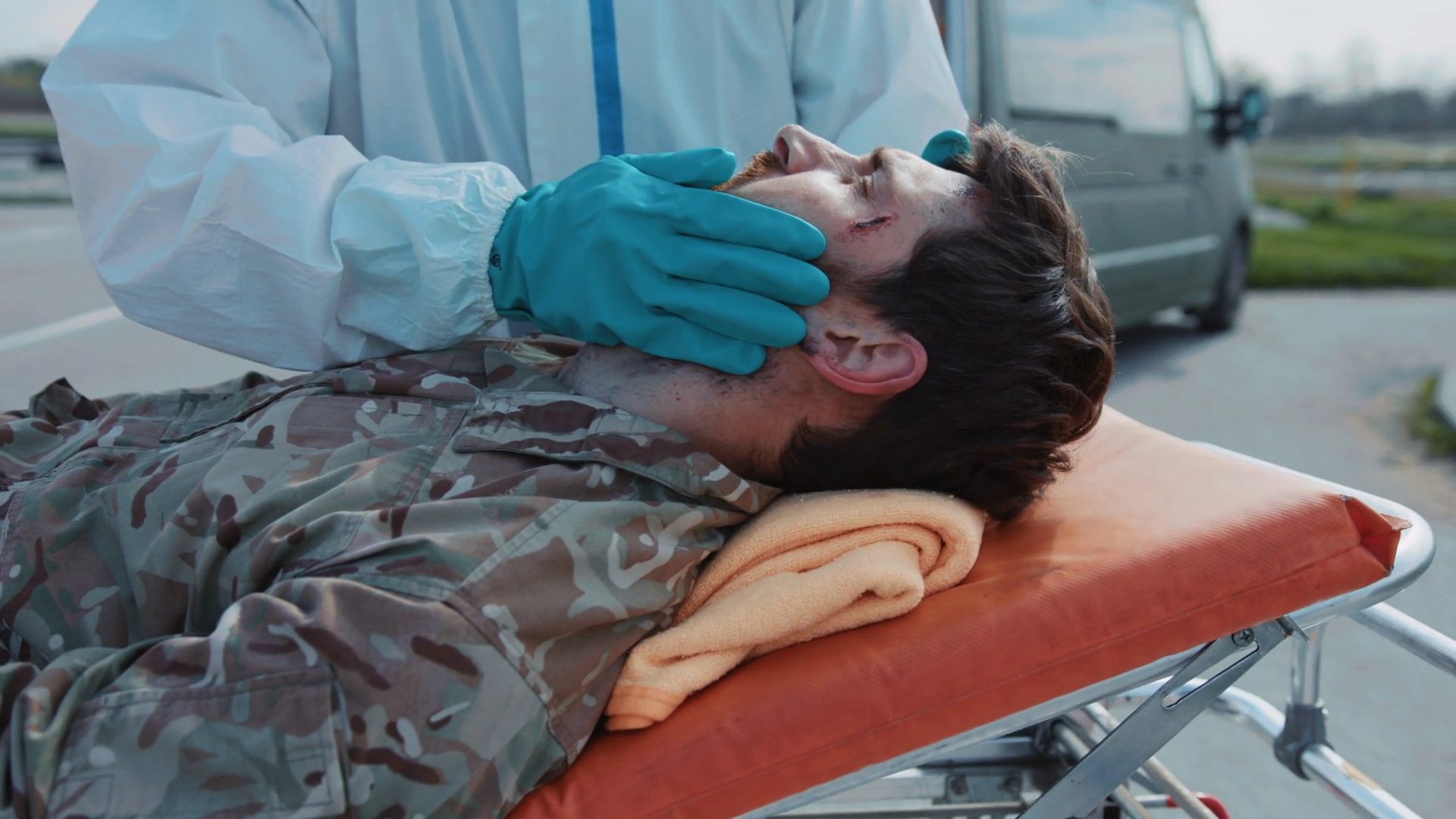 Doctor Examining Shrapnel Wound On Face Of Stock Footage SBV-352141405 ...