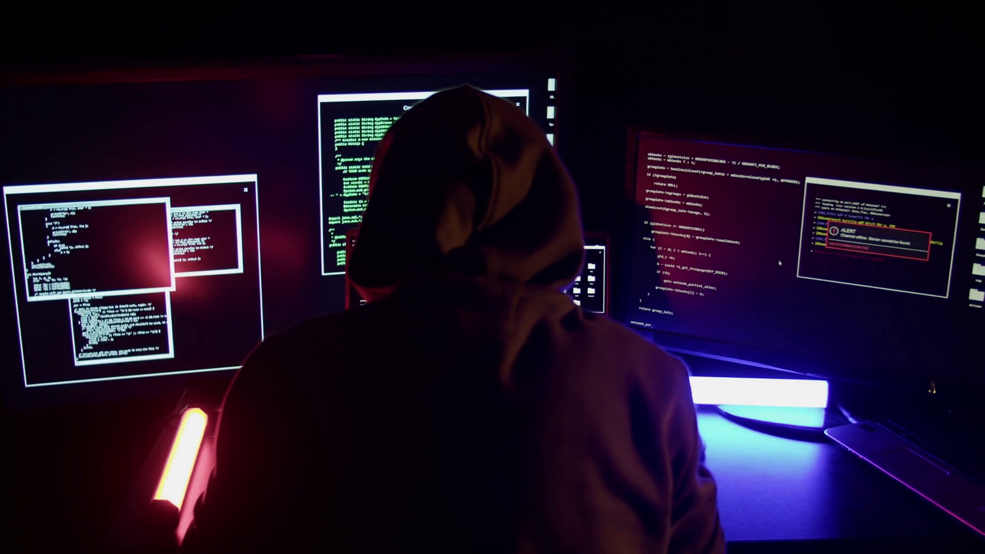 Hacker among many monitors in a dark room Stock Video Footage 00:13 SBV ...