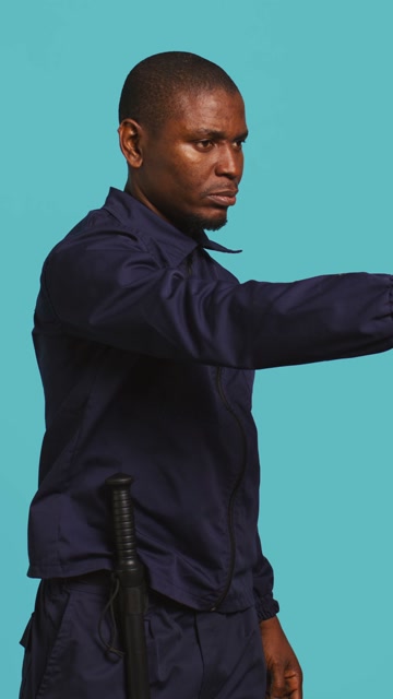 Security Guard Stopping People Stock Footage: Royalty-Free Video Clips ...