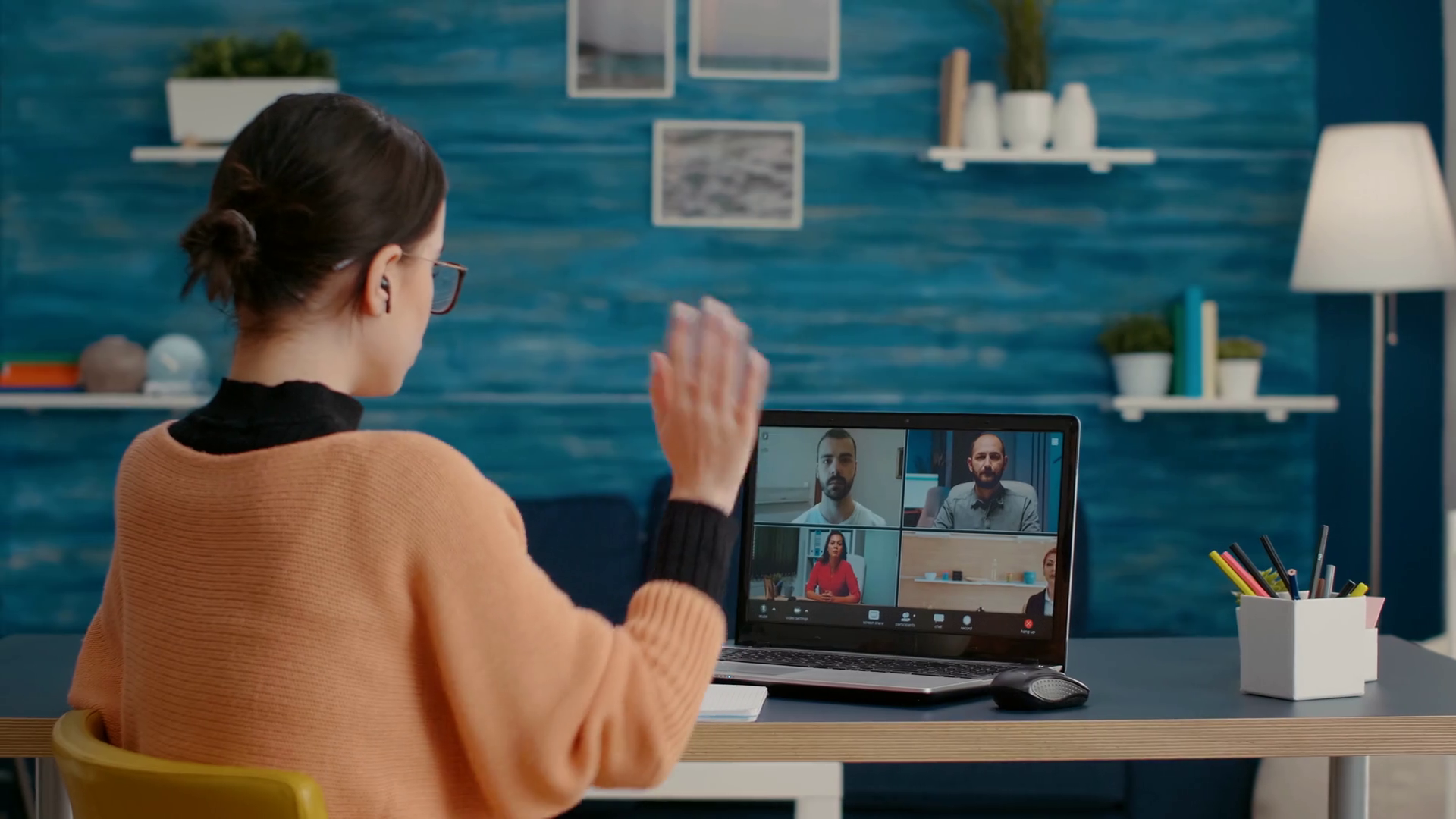 College student using laptop to attend remote videocall webinar with ...