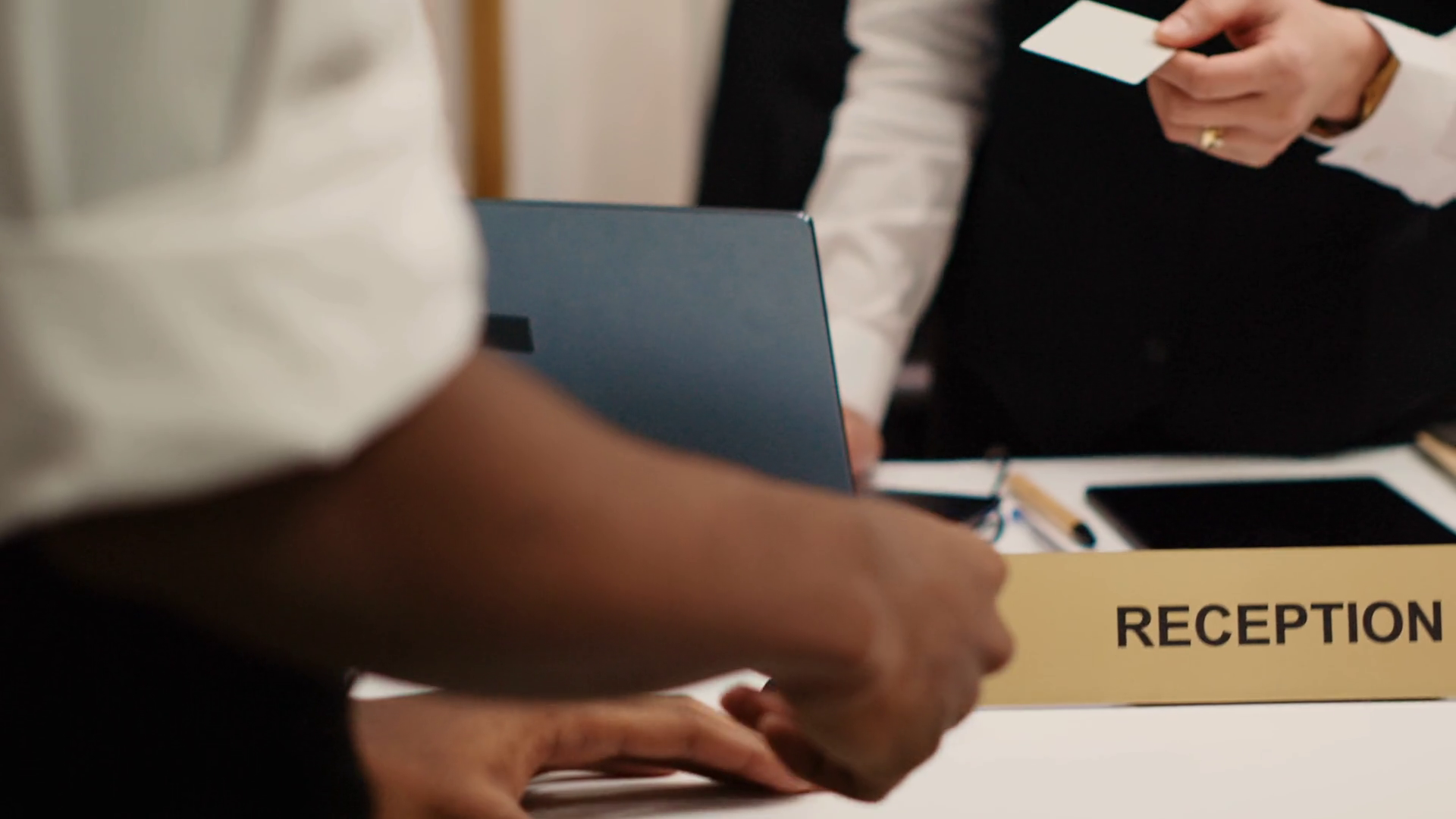 Close Up Of Receptionist Handing Card Key To Stock Footage SBV ...