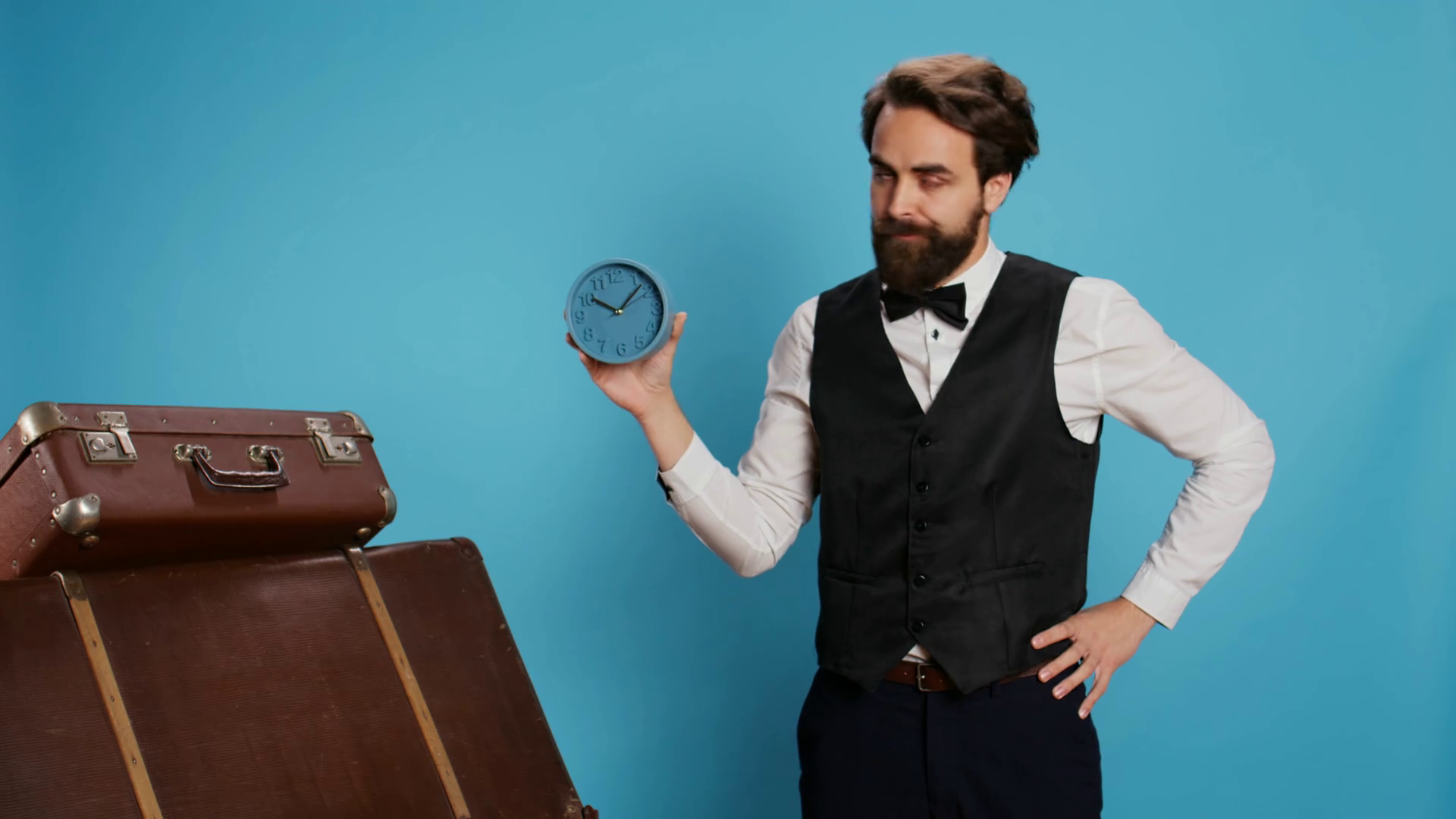 Classy Bellhop Poses With Wall Clock Looking Stock Footage SBV ...