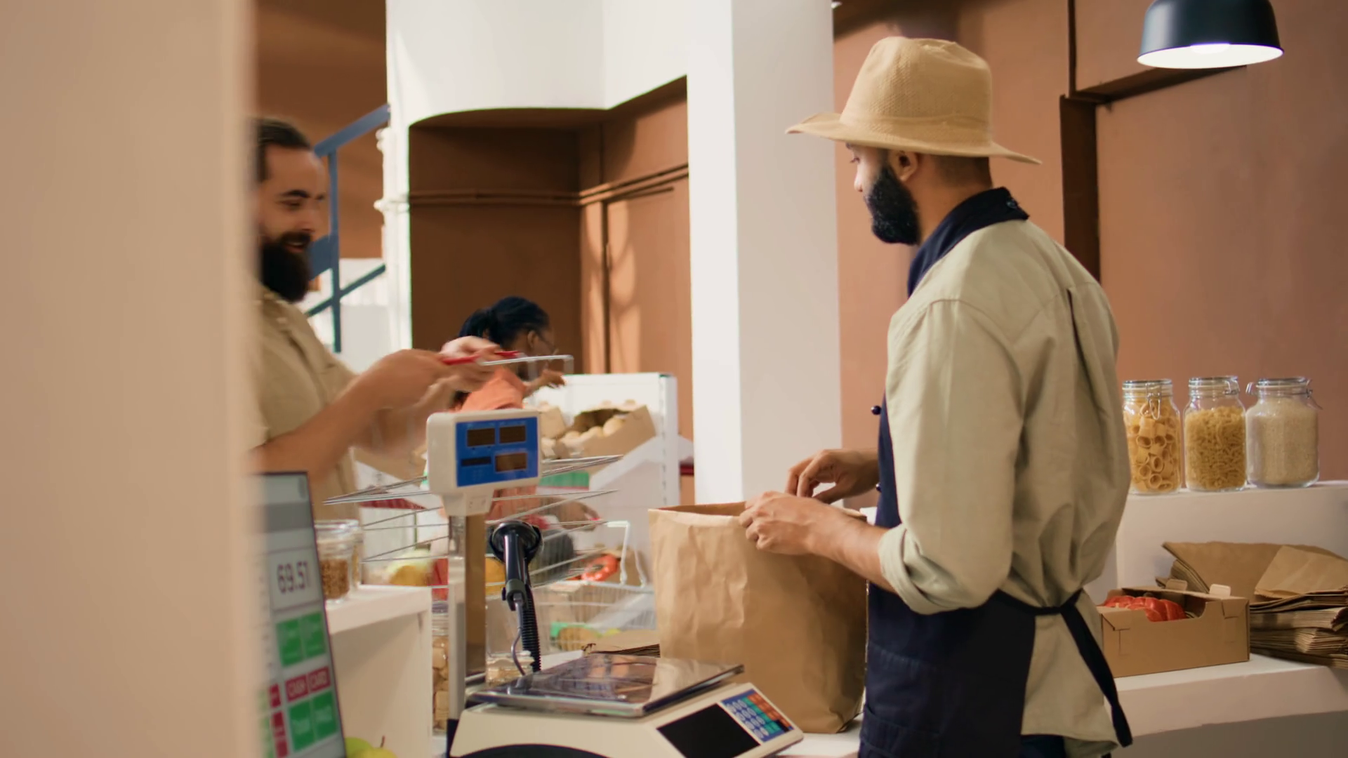 Store Owner Serving Client With Produce Stock Footage SBV-348628303 ...