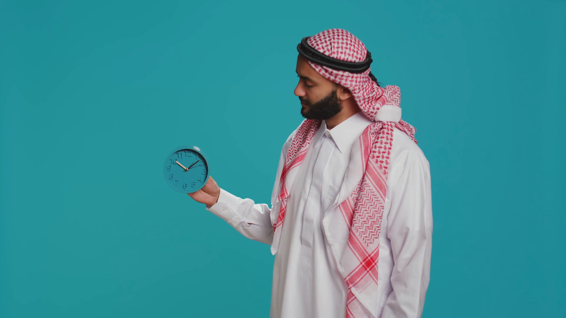 Islamic Adult Looks At Wall Clock To Check Stock Footage SBV-348705323 ...