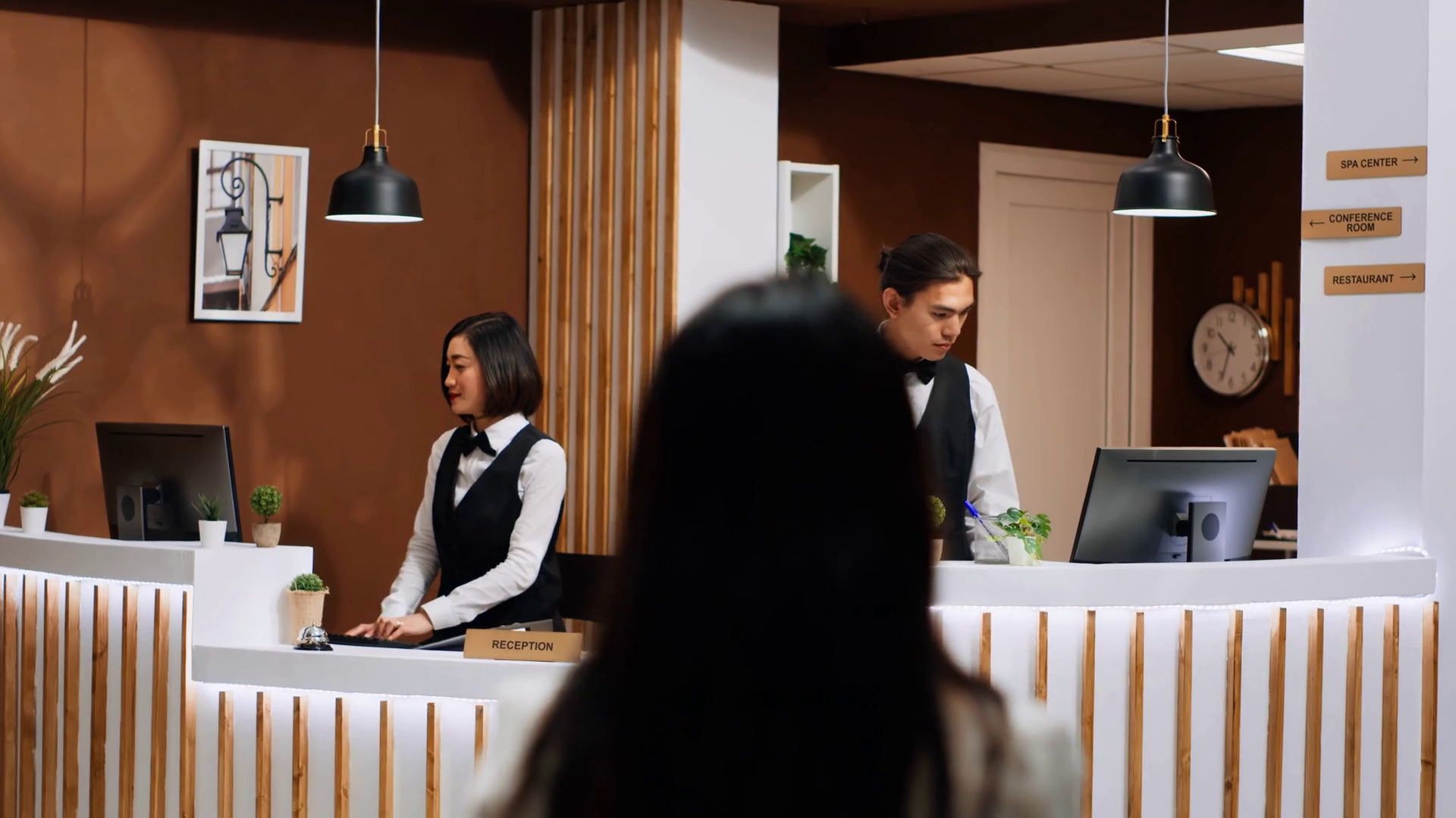 Front Desk Team Staff Welcoming Hotel Guest Stock Footage SBV-348808927 ...