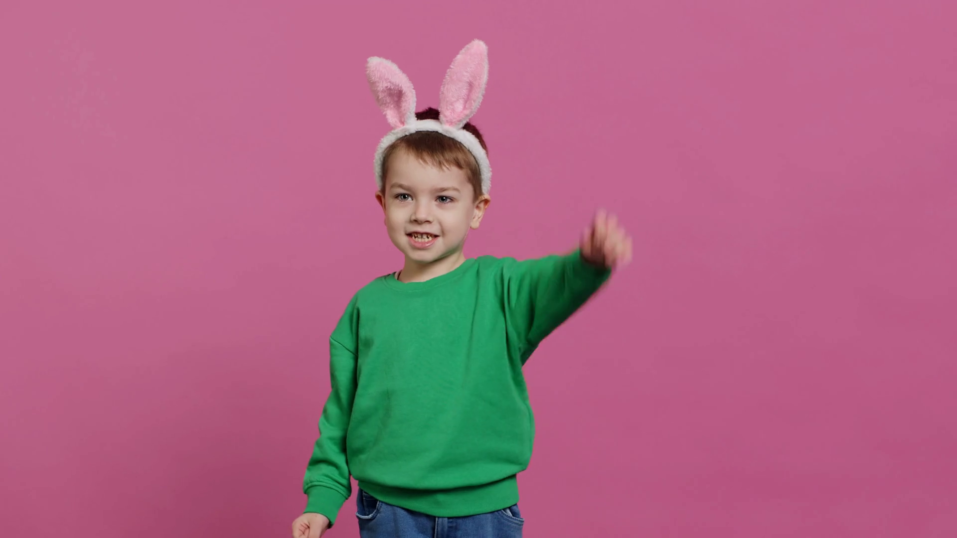 Joyful Small Kid Waving Greeting In Studio Stock Footage SBV-348872609 ...