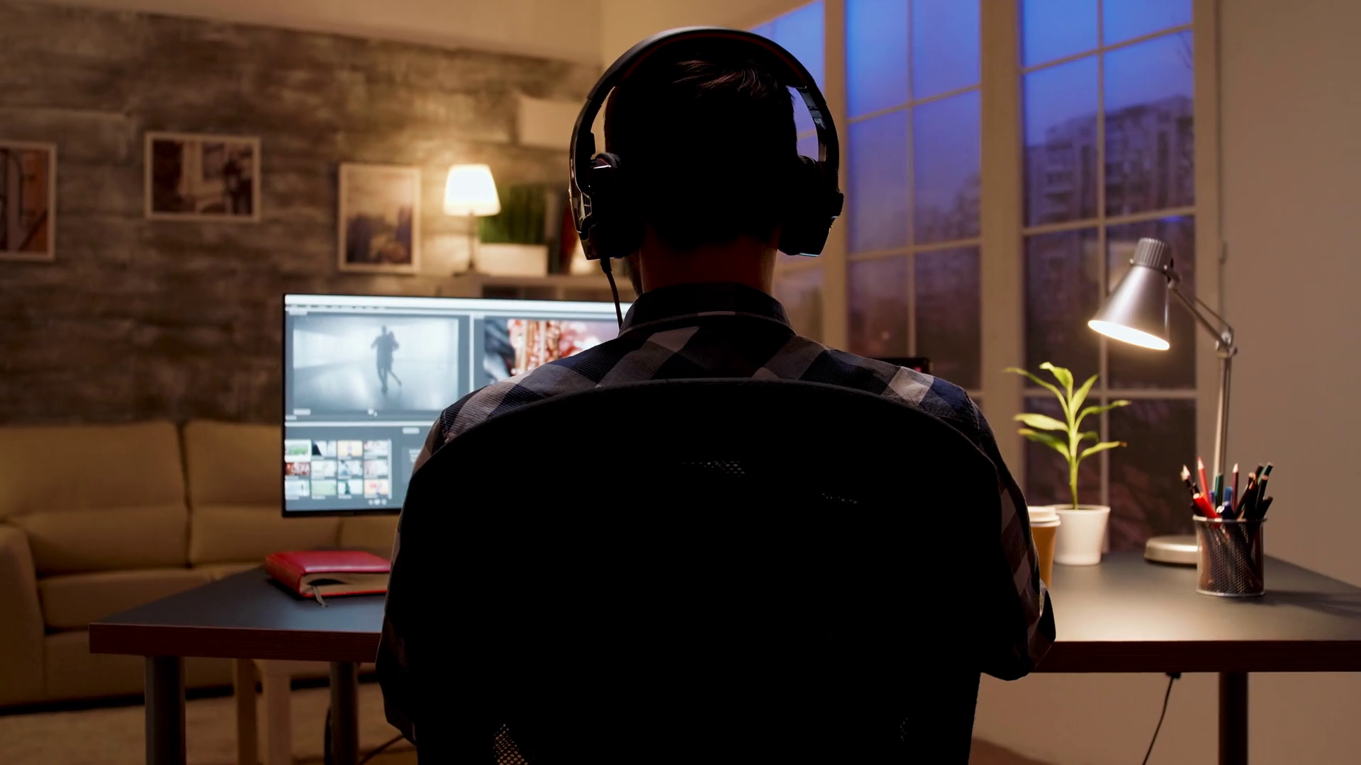 Back View Of Videographer Editing Movie Stock Footage SBV-337950128 ...