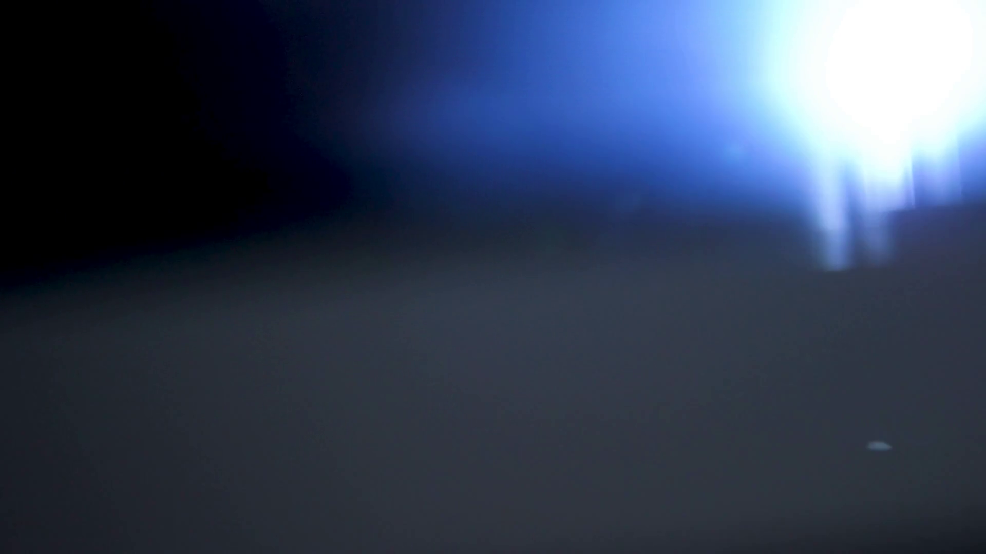Blue Lens Flare Blinking Over Black Stock Footage SBV-327136164 ...