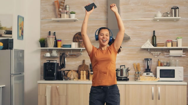Girl Dancing In Kitchen Stock Footage: Royalty-Free Video Clips ...