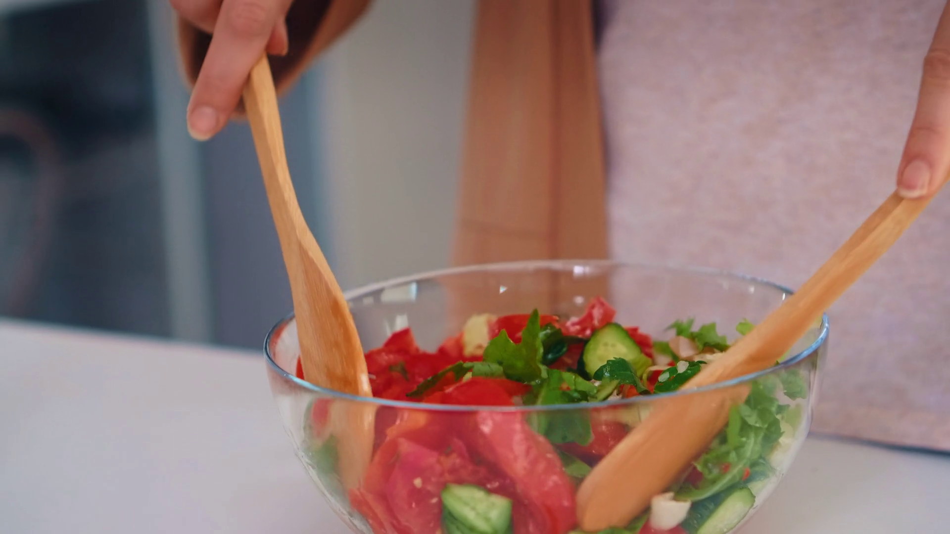 Woman Mixing Salad With Wooden Spoons Stock Footage SBV-338595410 ...
