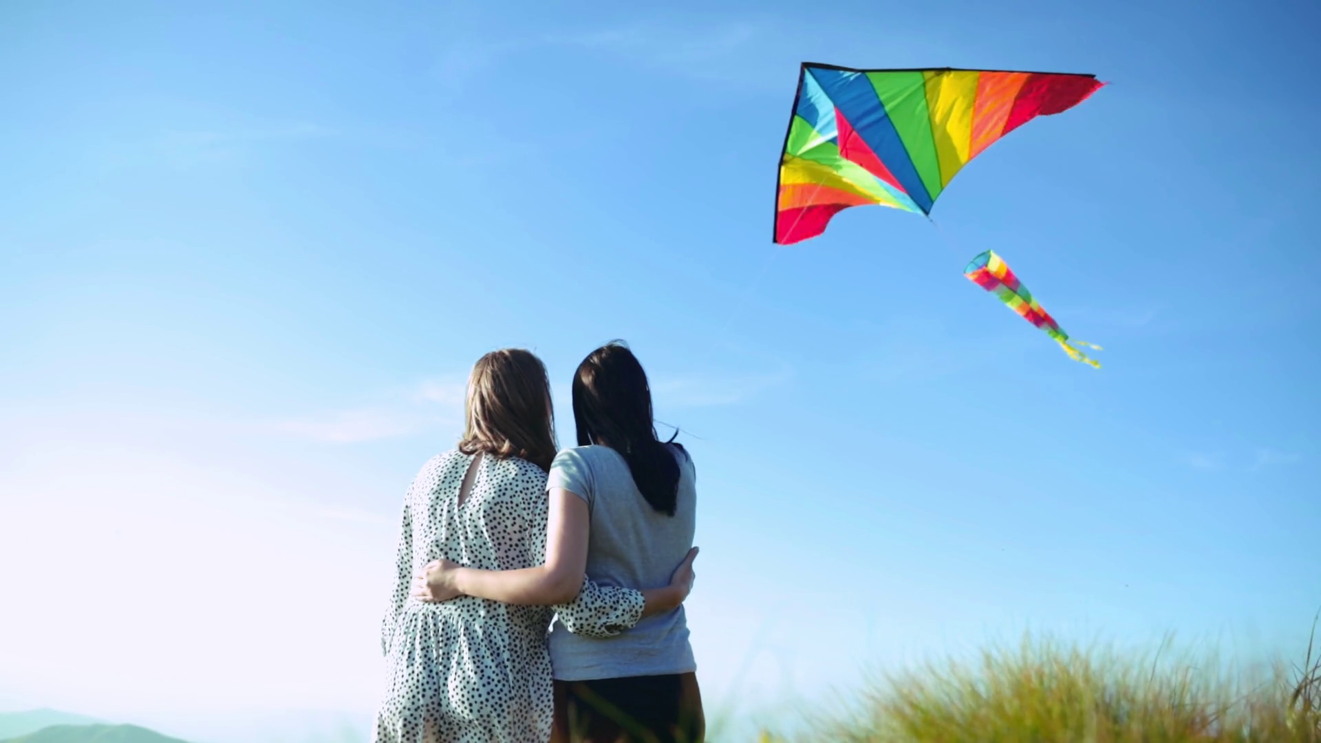 Cheerful Women Enjoying Colorful Kite In Stock Footage SBV-337332203 ...