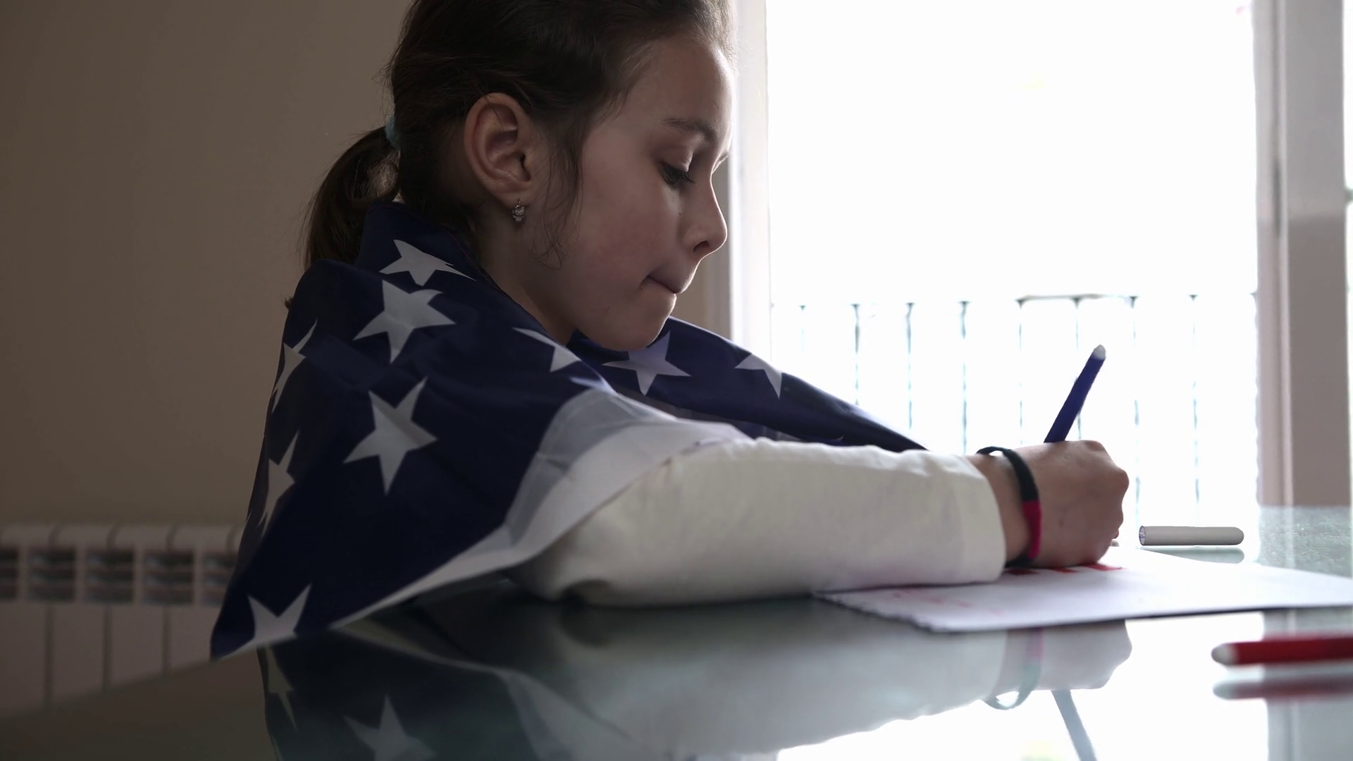 Young Girl Drawing Draped In Flag Stock Footage SBV-352110032 - Storyblocks
