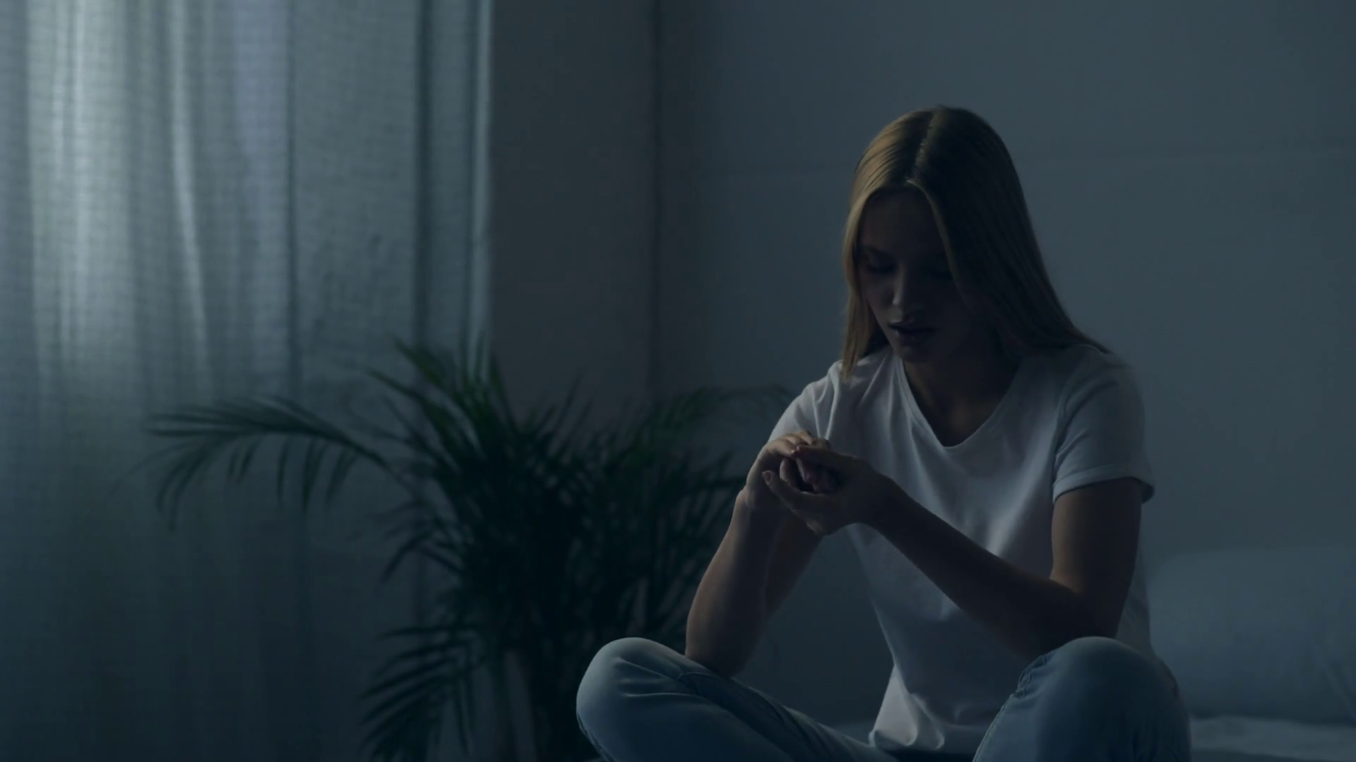 Expressing Sadness: Young Woman Alone Stock Footage SBV-319823002 ...